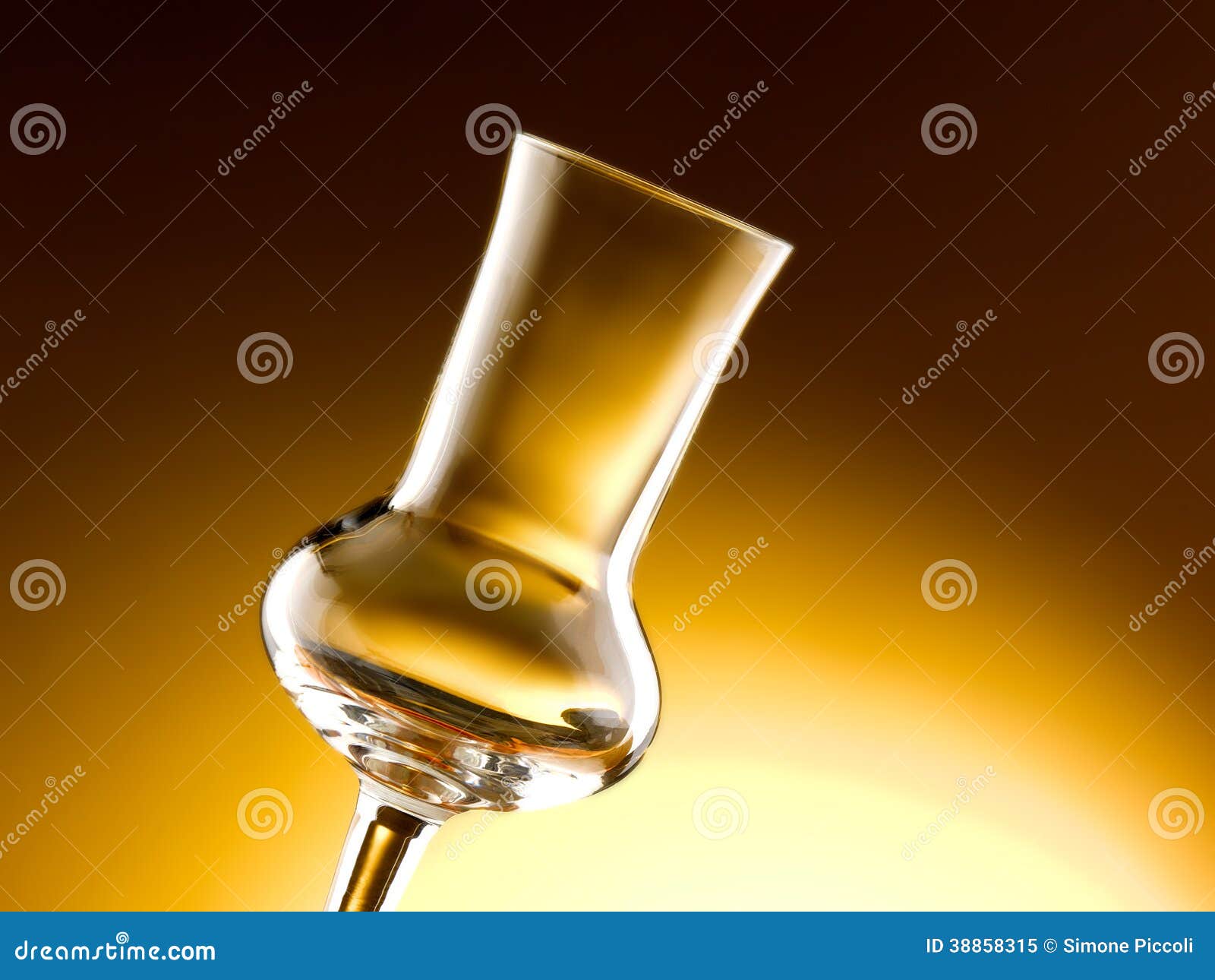 Glass of grappa stock image. Image of liquor, pour, bright - 38858315