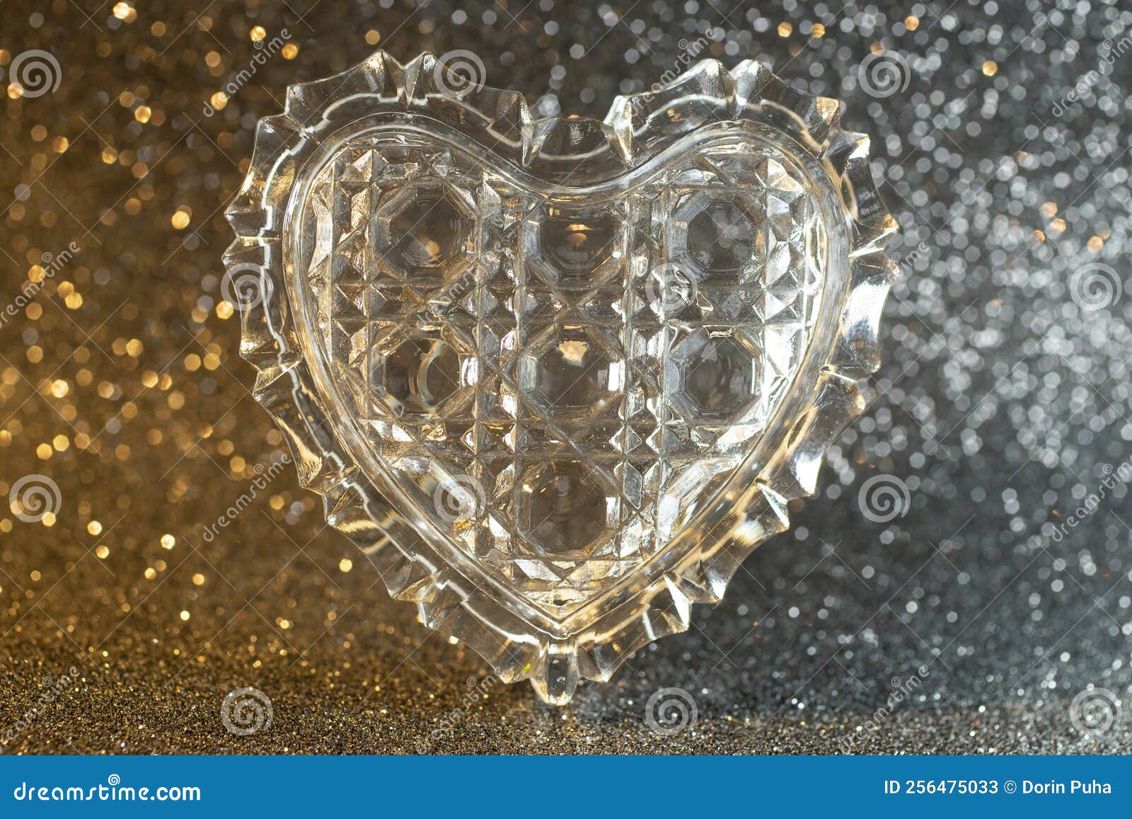 Glass Heart with Geometric Pattern Illuminated with Warm and Cold Light ...