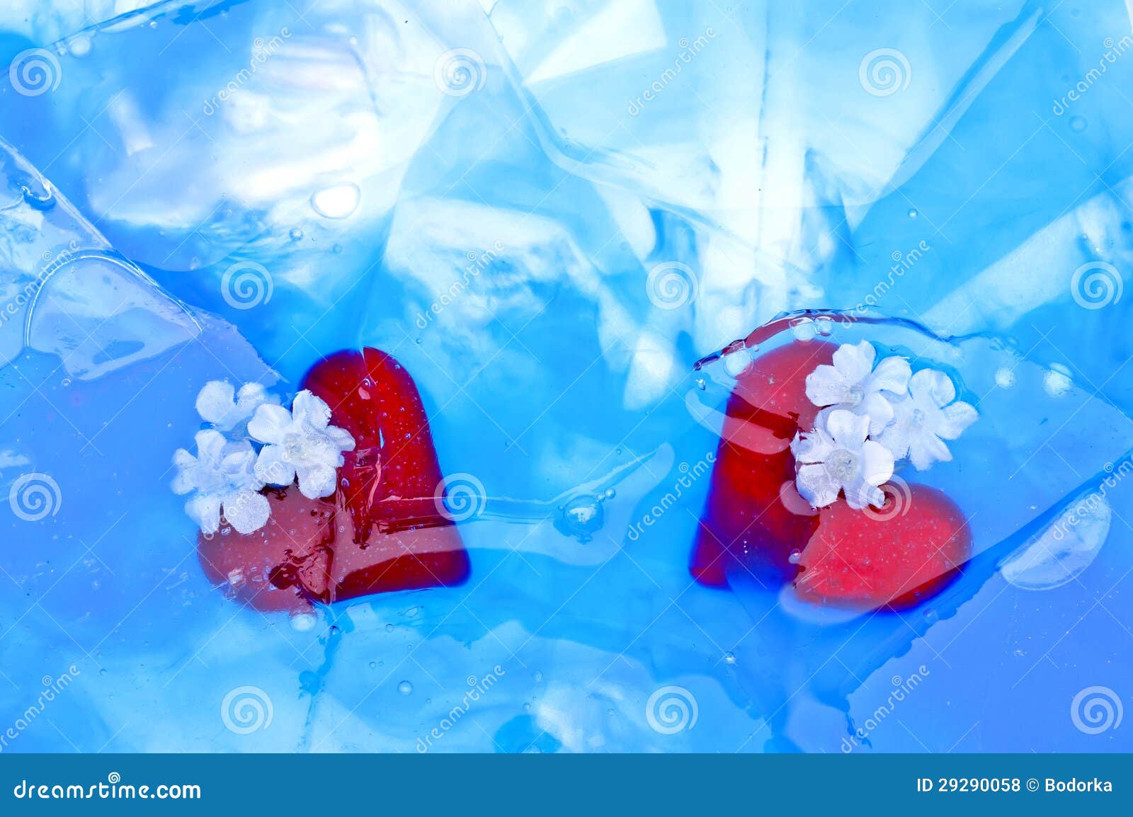 Glass hearts in broken ice stock photo. Image of blue - 29290058