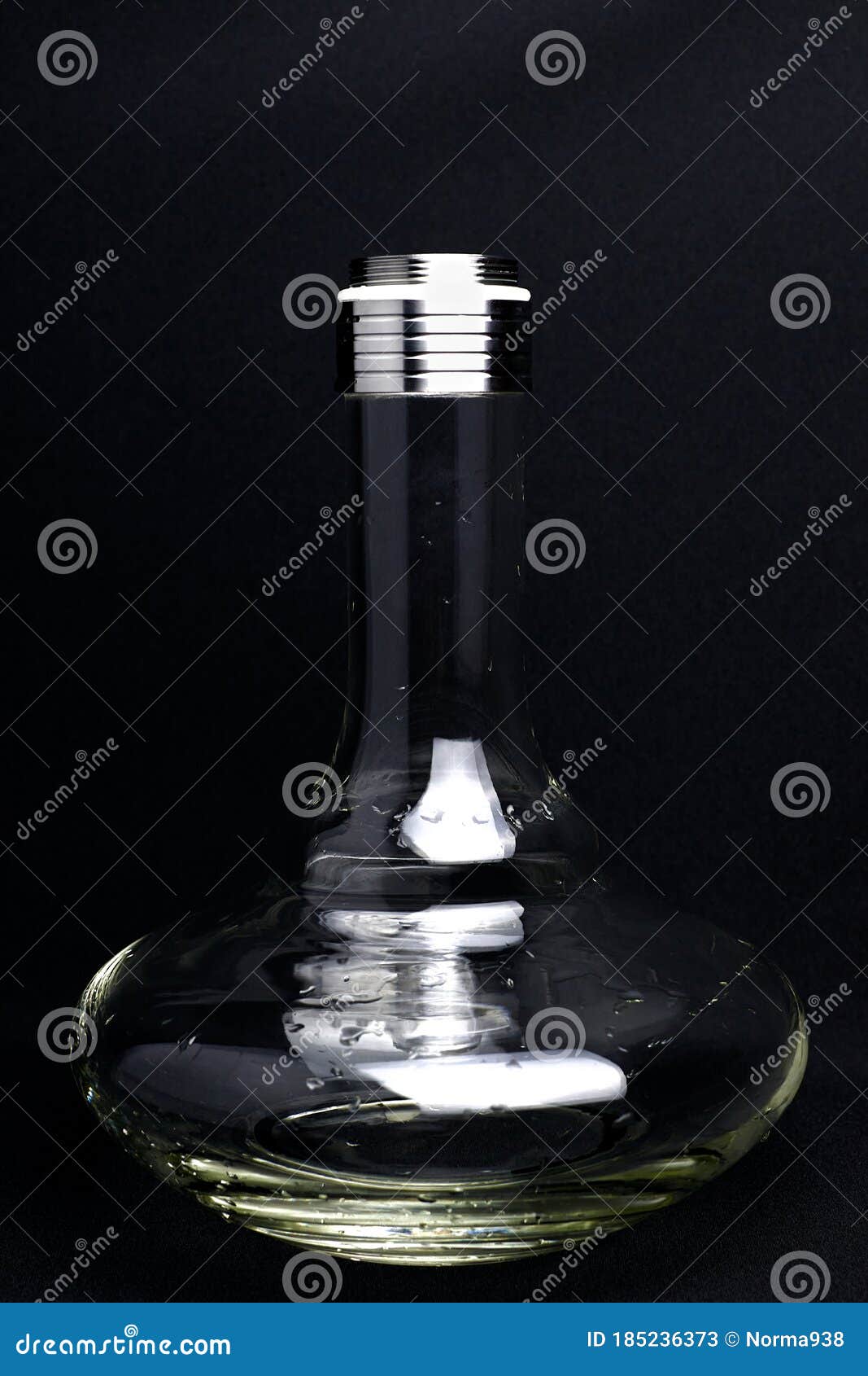 A Glass Hookah Flask Filled With Bubbling Water And Smoke Glows In The ...