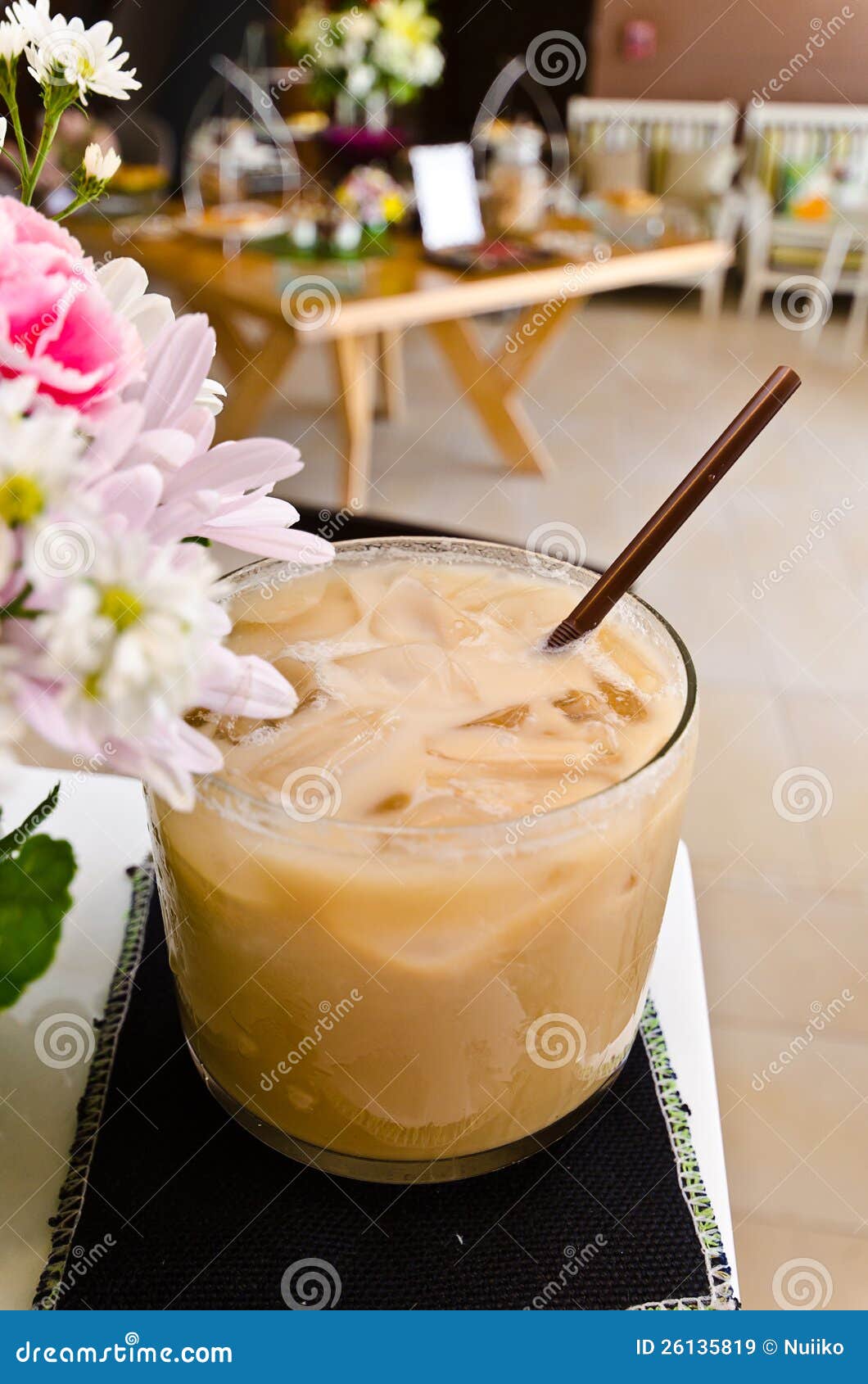 A Glass of Ice Coffee on Table. Stock Image - Image of chair, flowers ...