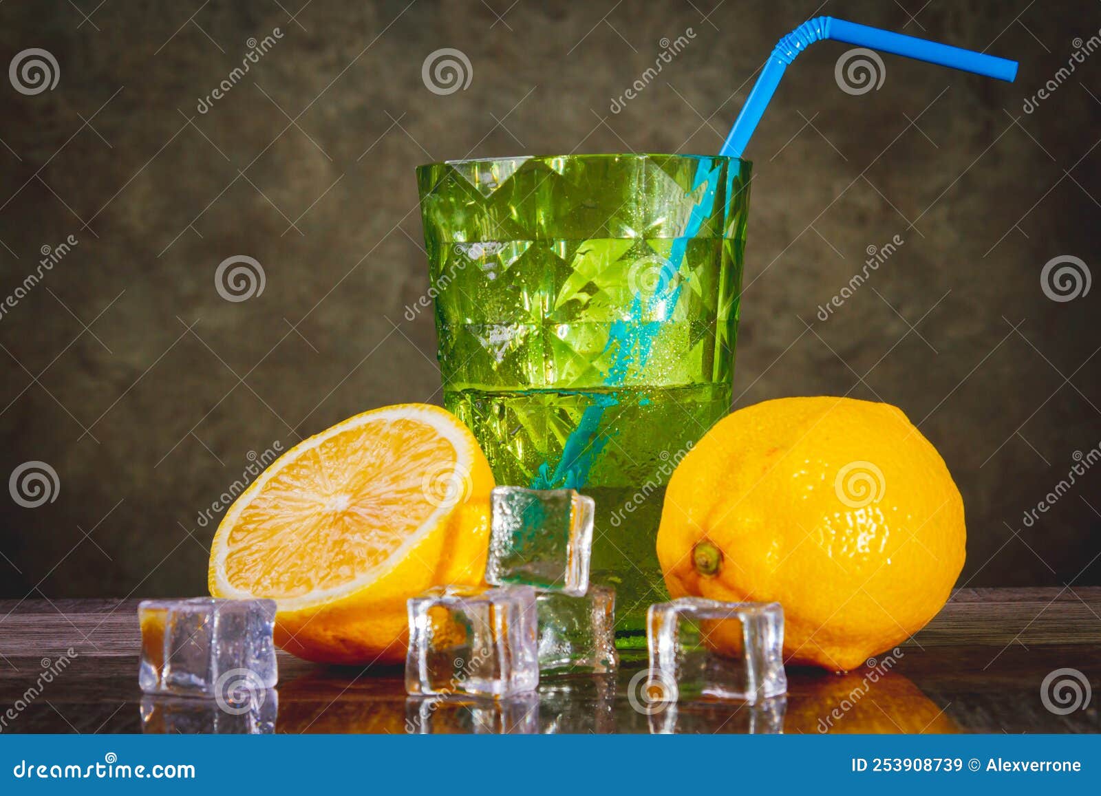 A Glass of Ice-cold Lemon Juice. Fruit Juice with Ice. Lemon Slices and ...
