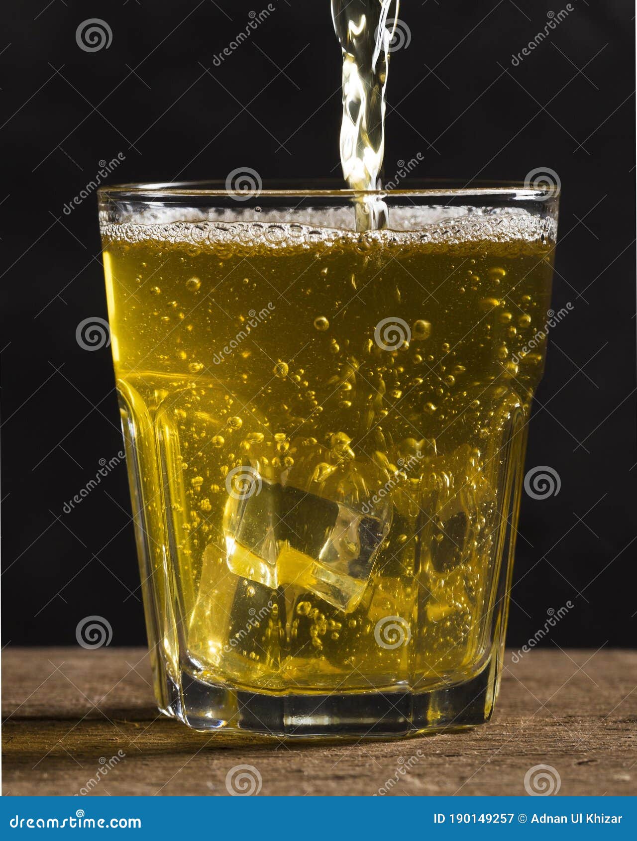 Glass with Ice Cubes and Beer Photo Stock Image - Image of beverage ...