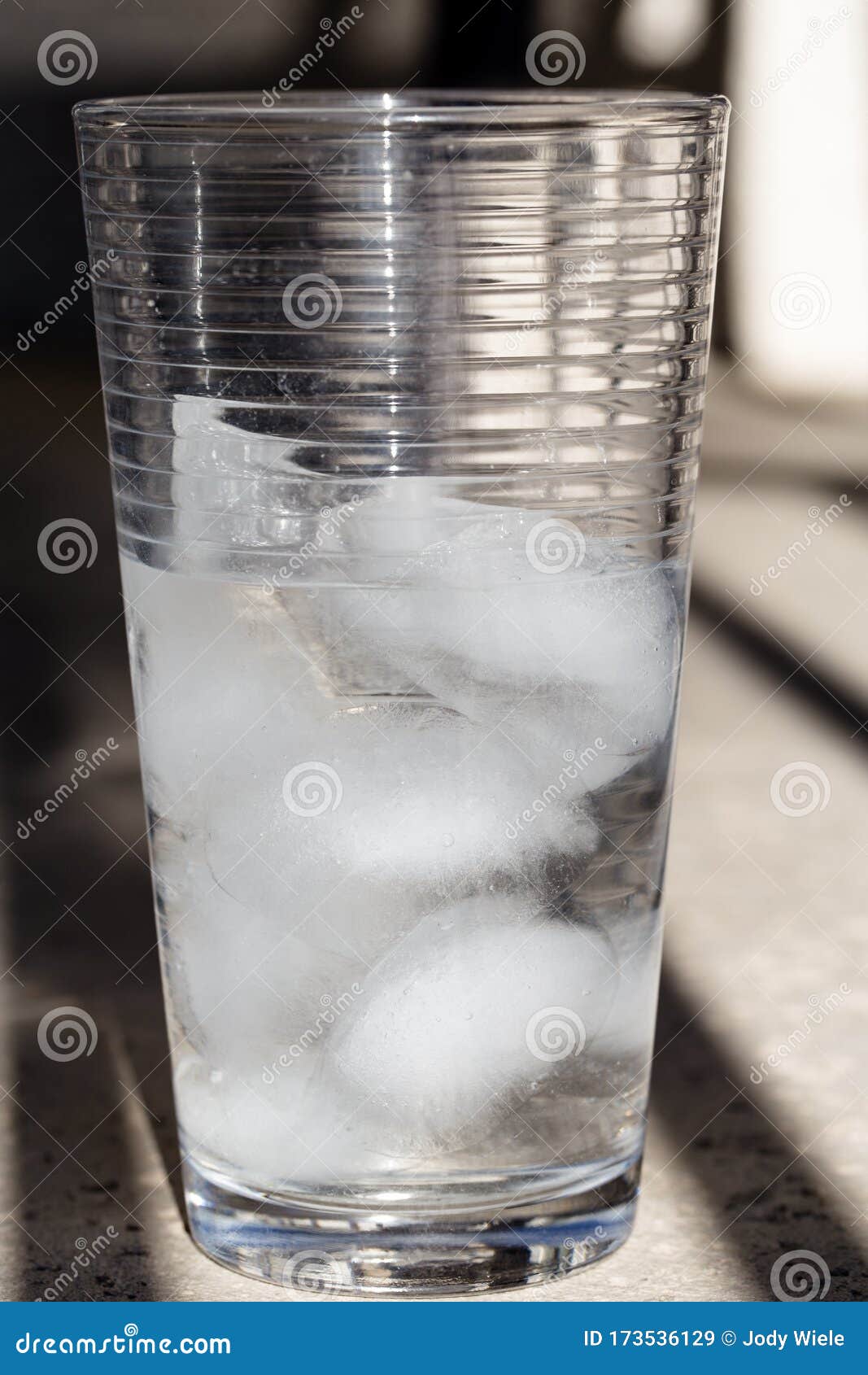 Half Melted Ice Cubes In A Clear Glass Royalty-Free Stock Photo ...