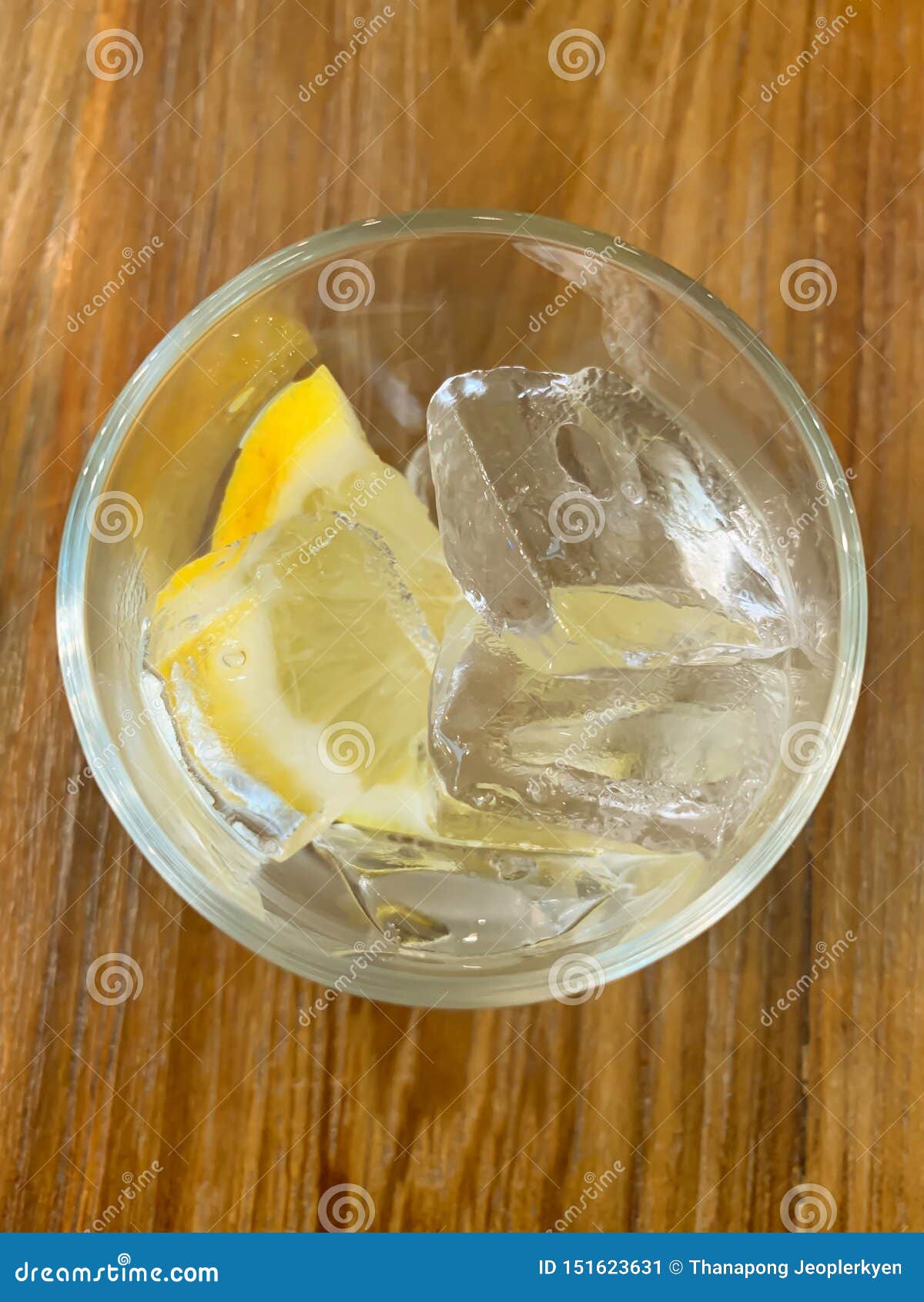 Glass Ice and Lemon on the Table Stock Image - Image of yellow, healthy ...