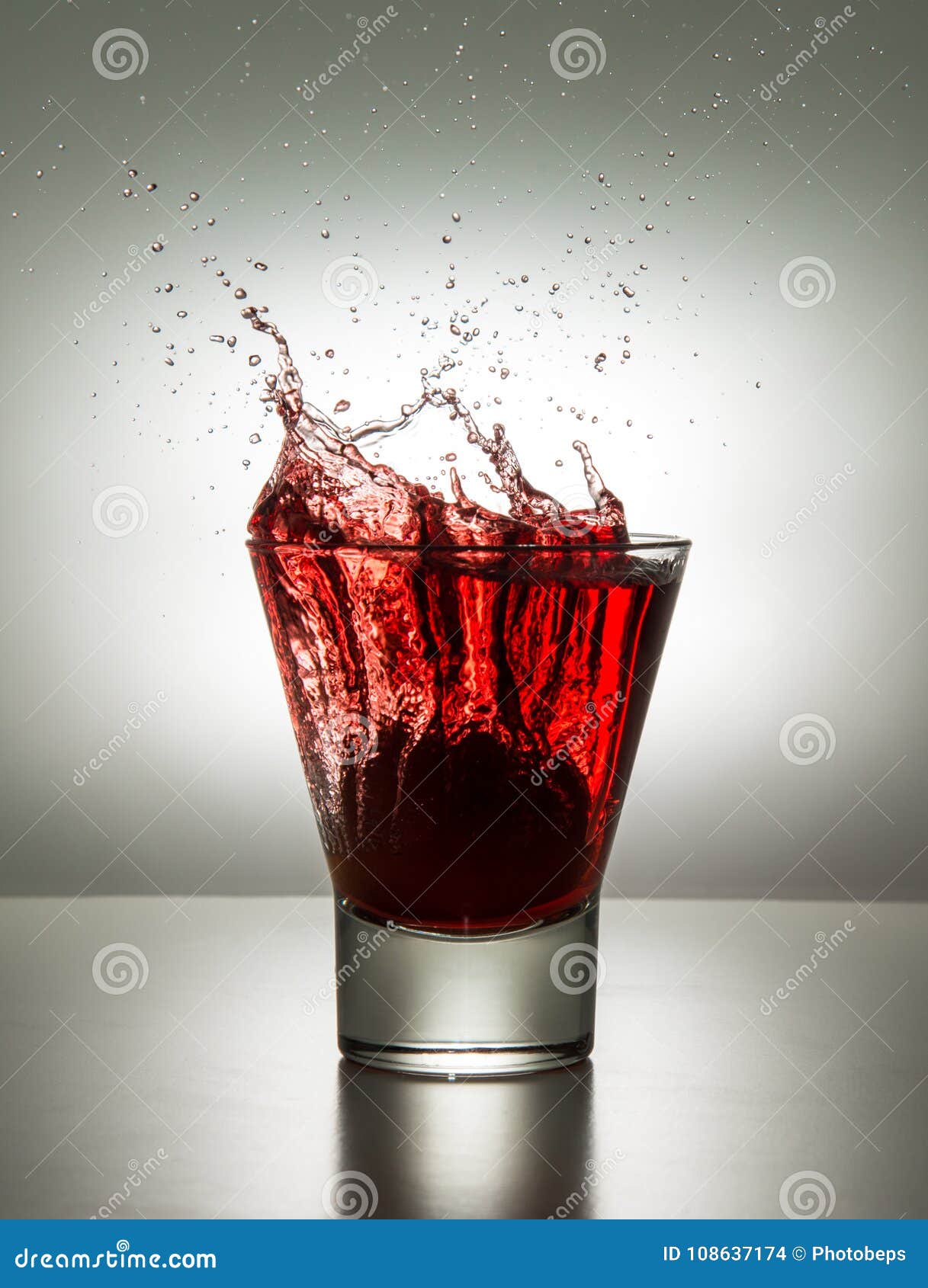 Glass with Ice and Liquid Splash Stock Photo - Image of liquid ...