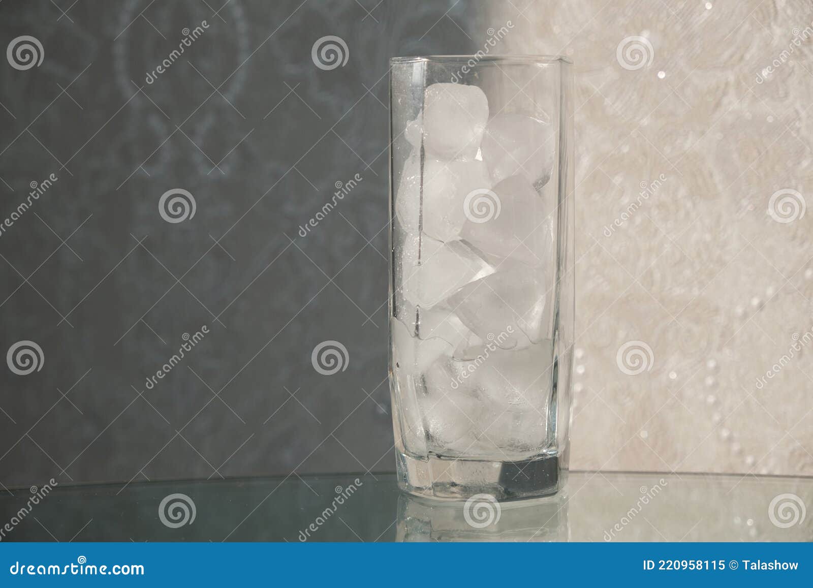 Glass with Ice on the Table Stock Image - Image of water, drink: 220958115