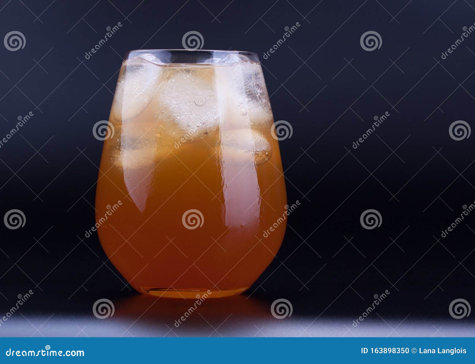 Glass of Ice Tea with Ice Cubes Stock Photo - Image of condensation ...
