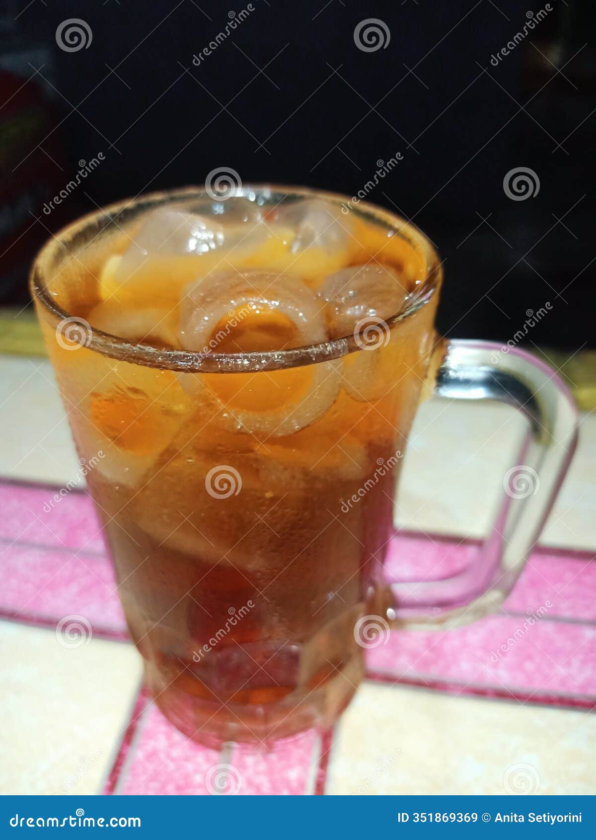 A Glass of Ice Tea at Night Stock Image - Image of night, drink: 351869369