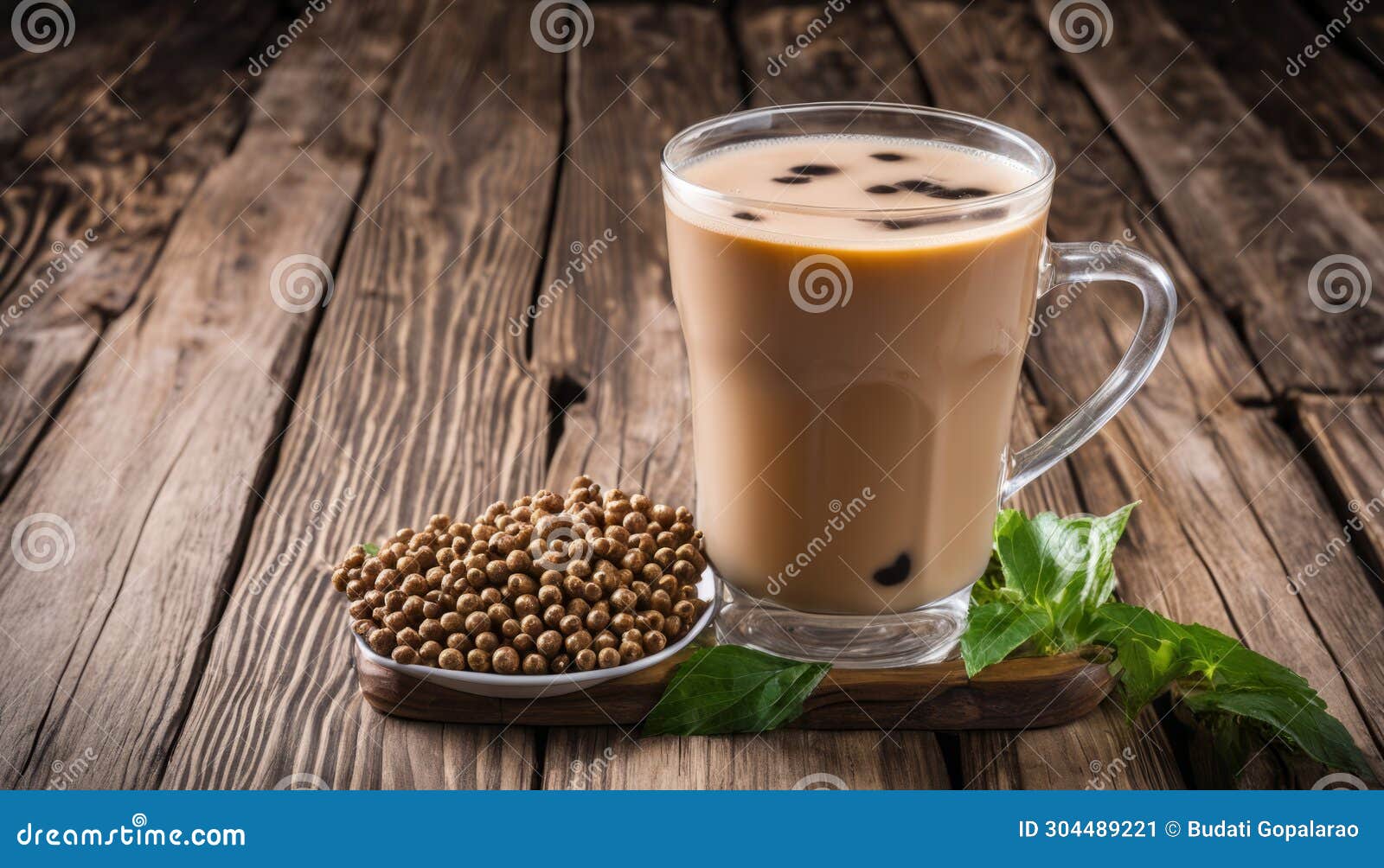 A Glass of Iced Coffee with Chocolate Chips and a Bowl of Nuts Stock ...