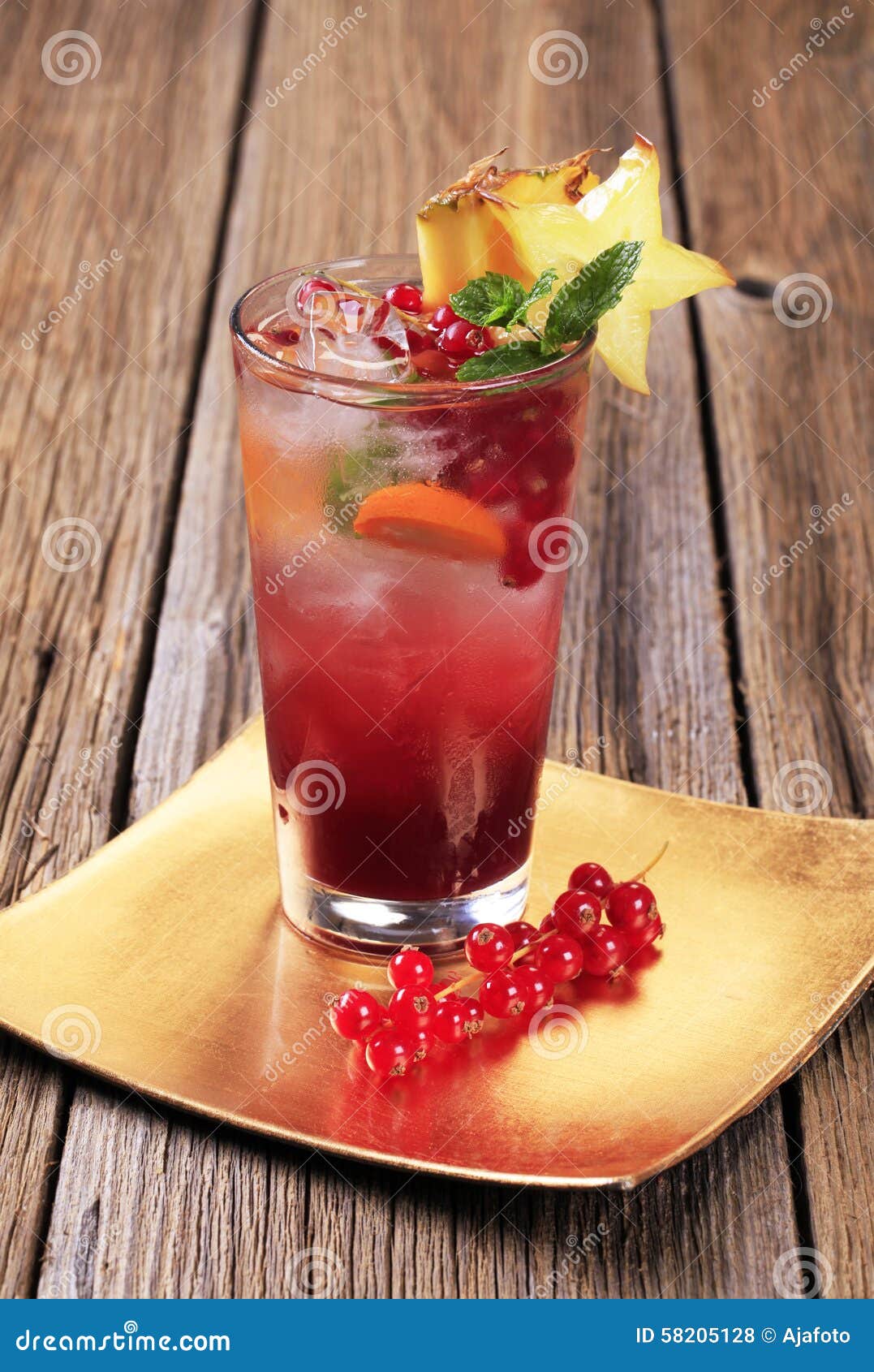 Iced Drink On A Background Of Tropical Fruits. Stock Photo ...