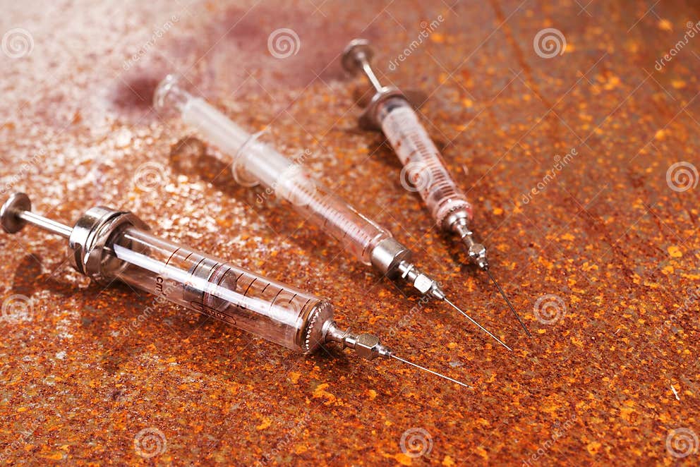 Glass Injection Syringes on Rusty Background Stock Photo - Image of ...