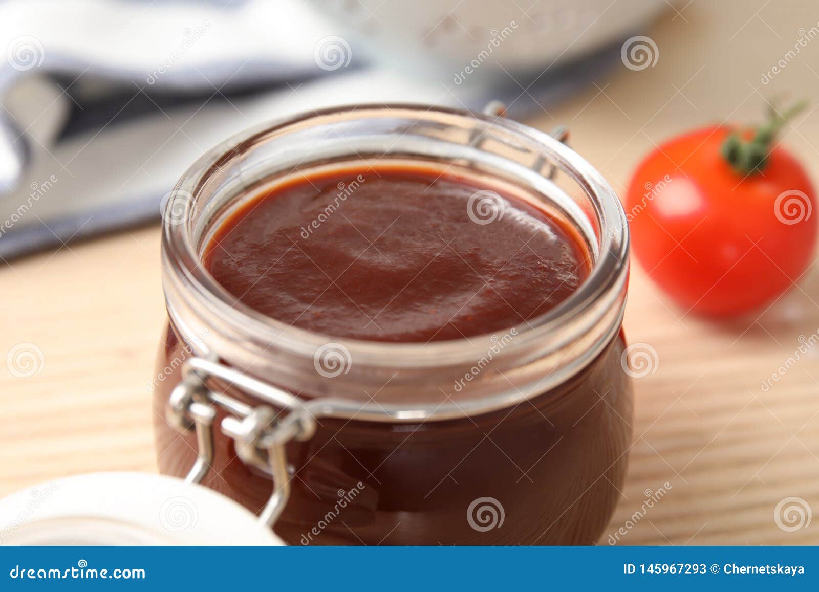 Glass Jar of Hot Barbecue Sauce on Table Stock Image - Image of ...