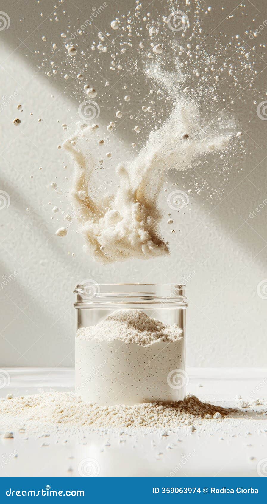 Flour Explosion from a Glass Jar in Bright Natural Light Stock Photo ...