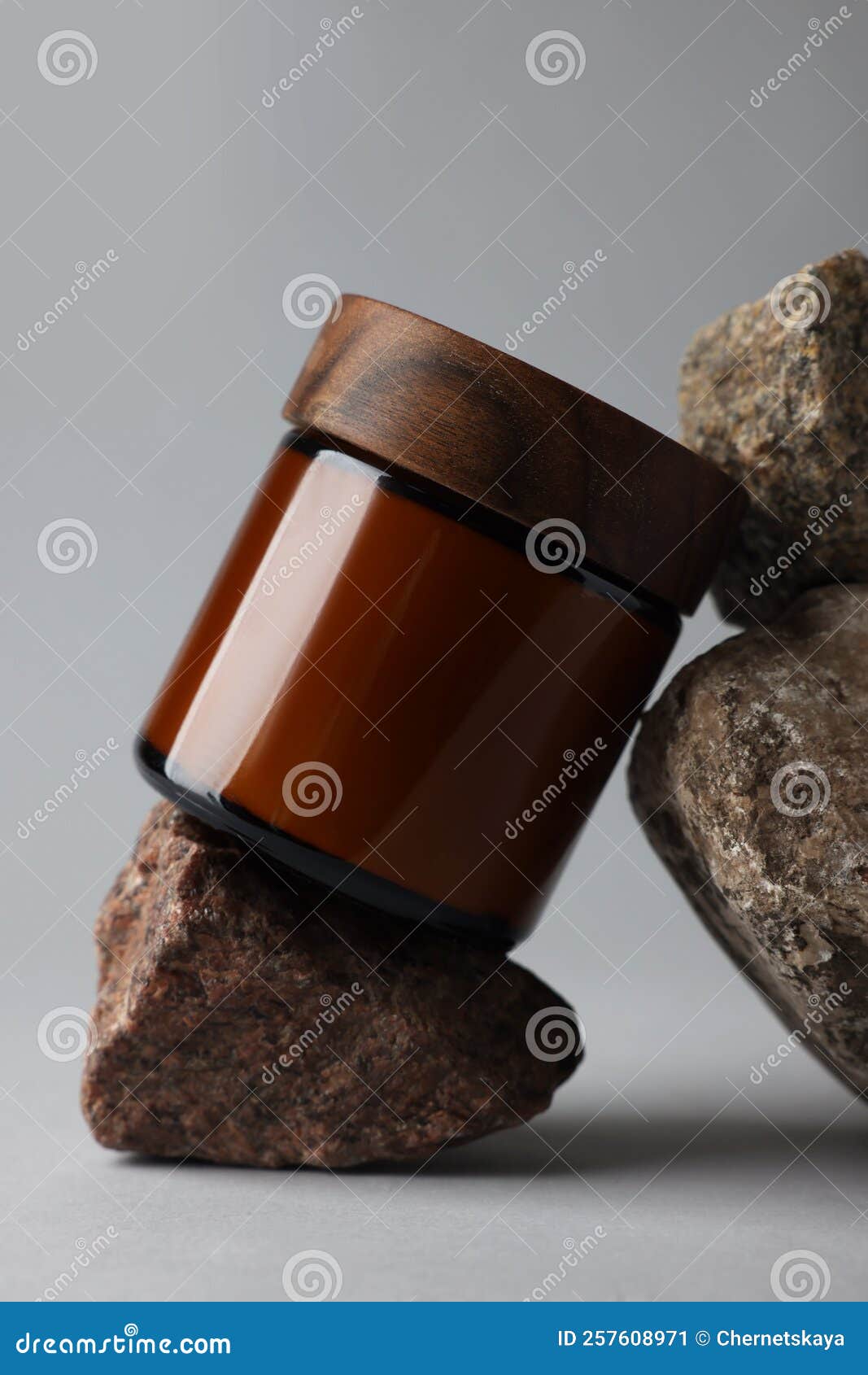 Glass Jar and Stones on Grey Background, Closeup Stock Image - Image of ...