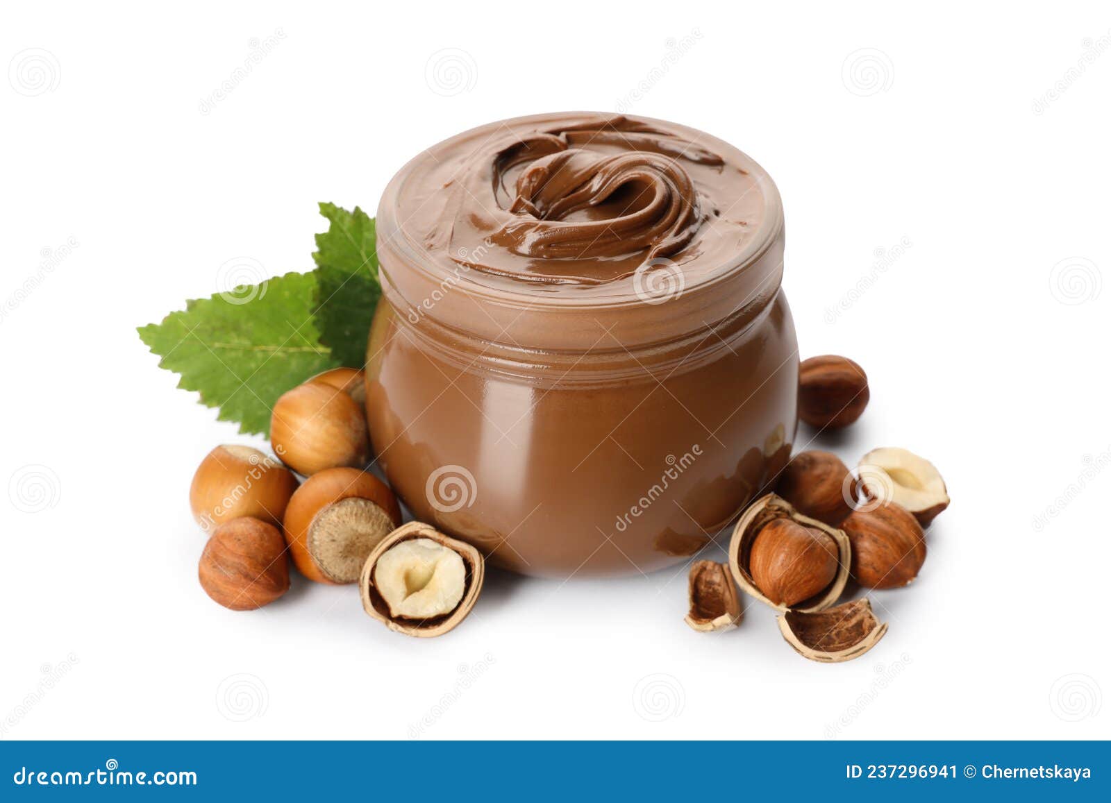 Glass Jar with Tasty Chocolate Hazelnut Spread and Nuts on White ...