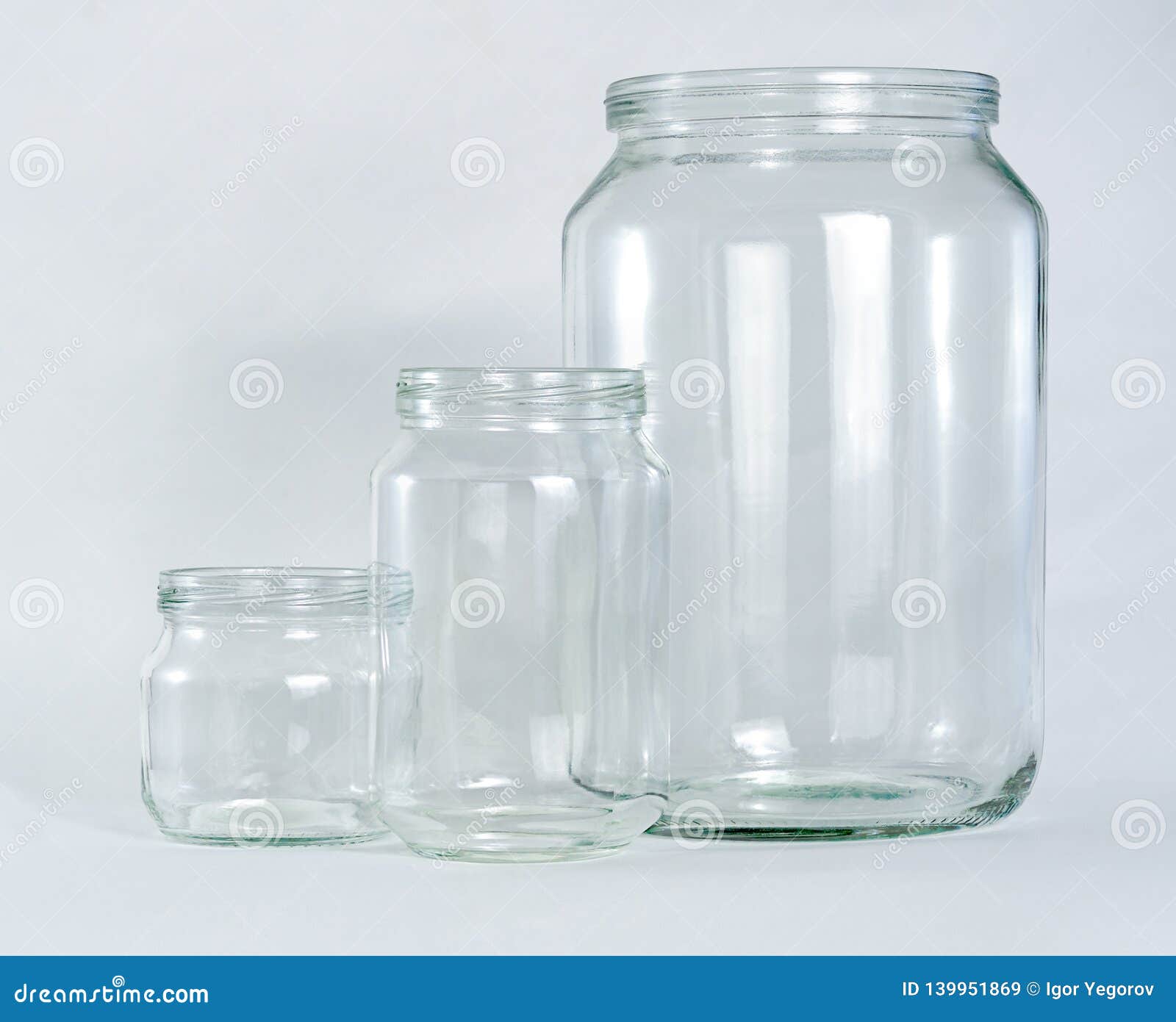 Glass jar three row stock image. Image of medium, glassware - 139951869