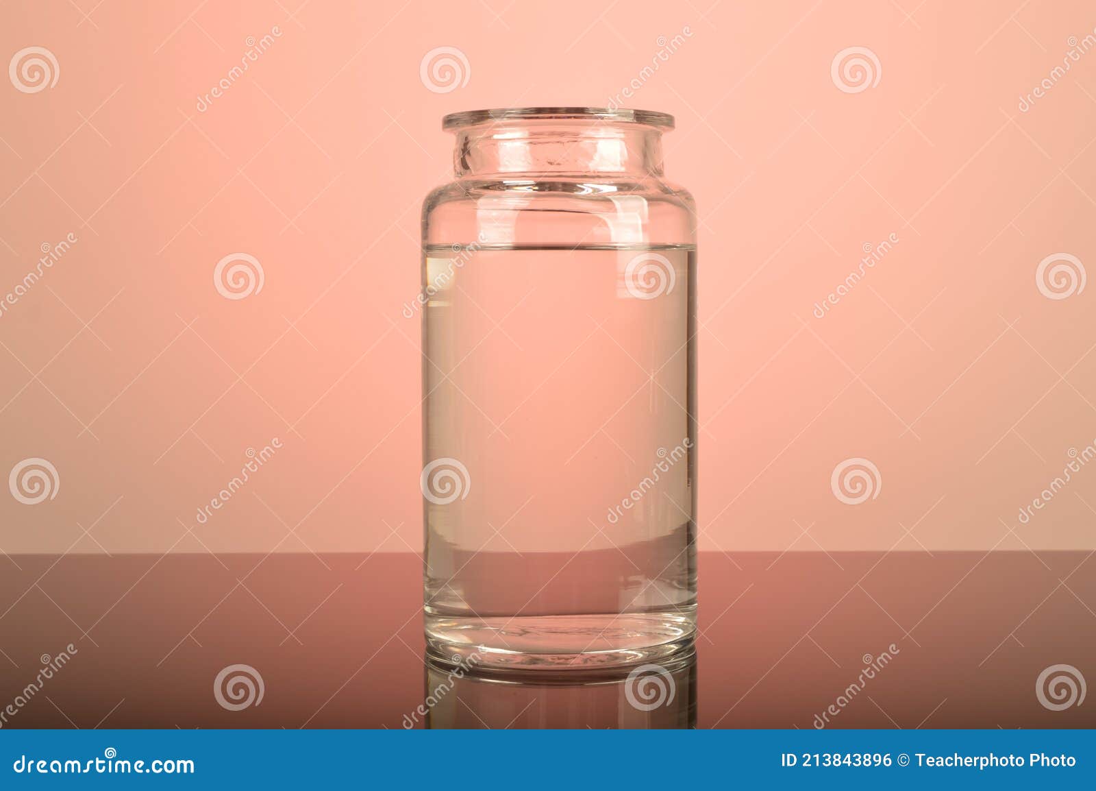 Glass Jar with Water on the Table Stock Photo - Image of isolated ...