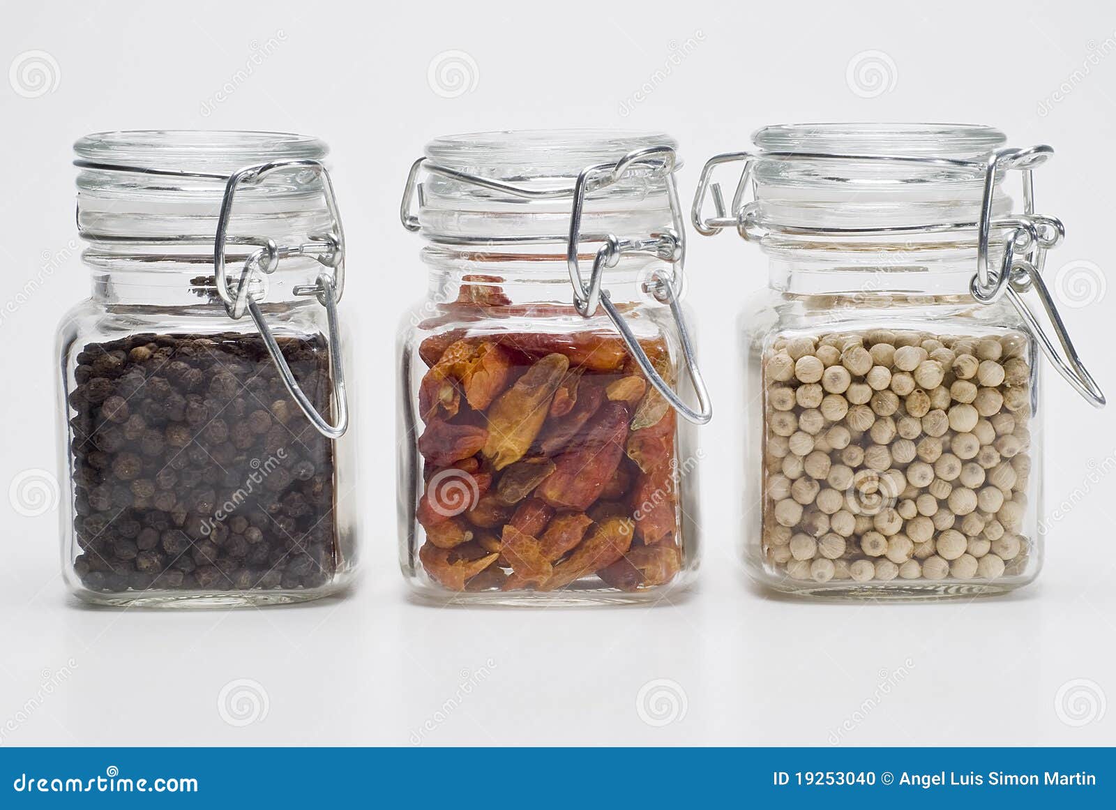 Glass jars full of spices. stock photo. Image of chili - 19253040