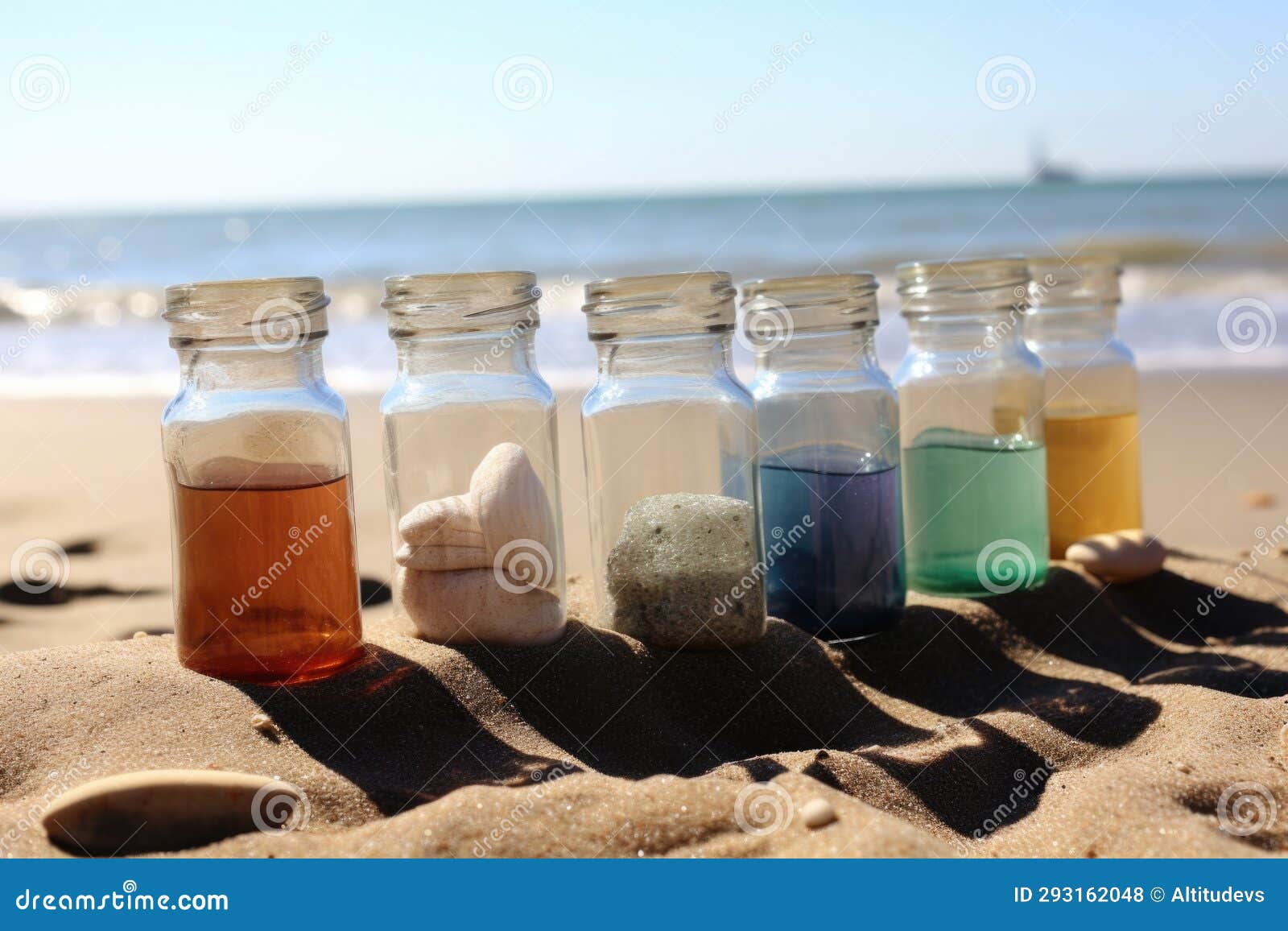 Glass Jars with Sand Samples from Different Beaches Stock Photo - Image ...