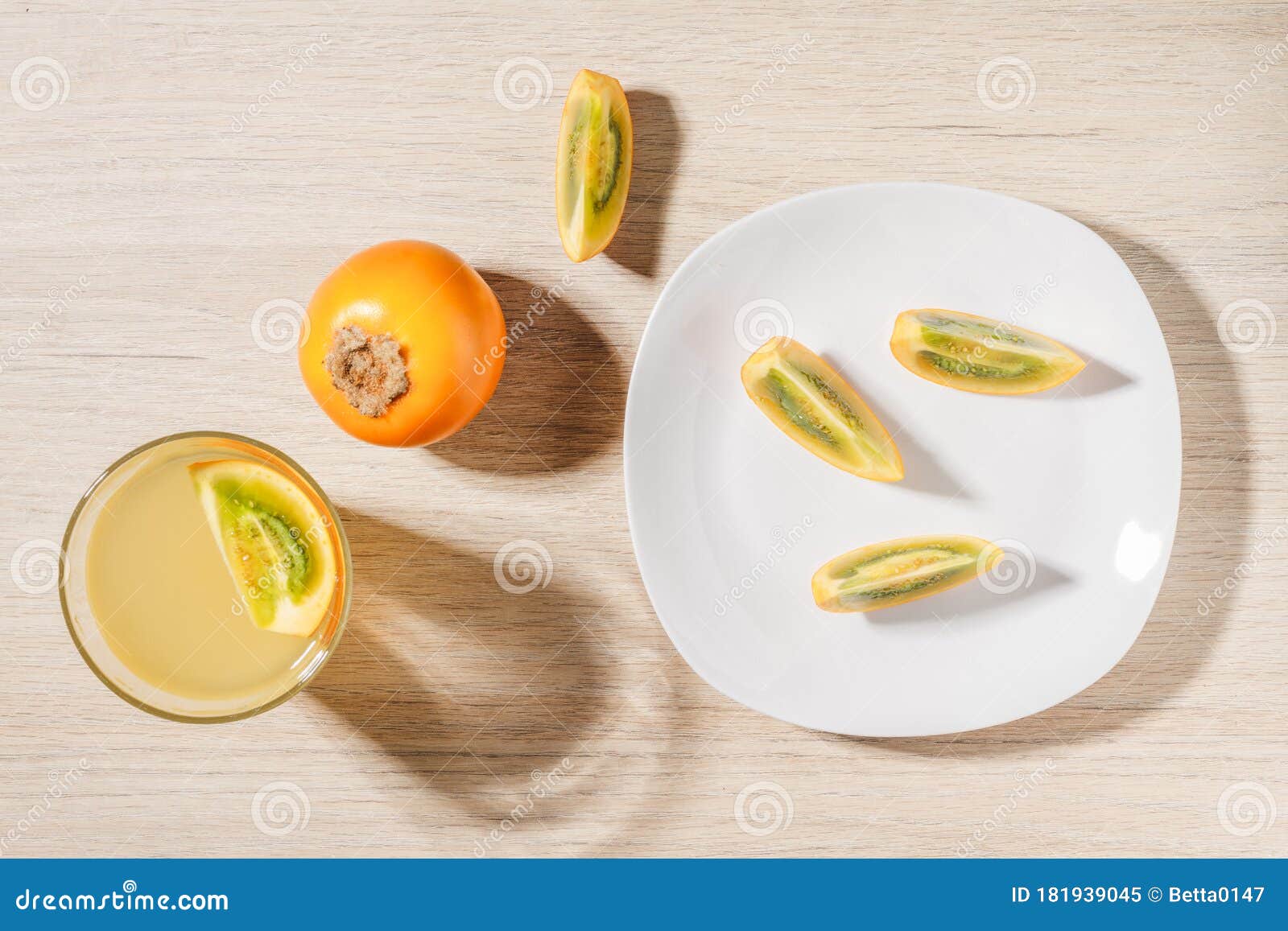 Glass with Juice and Slices of Lulo Fruit, on the Table Stock Image ...