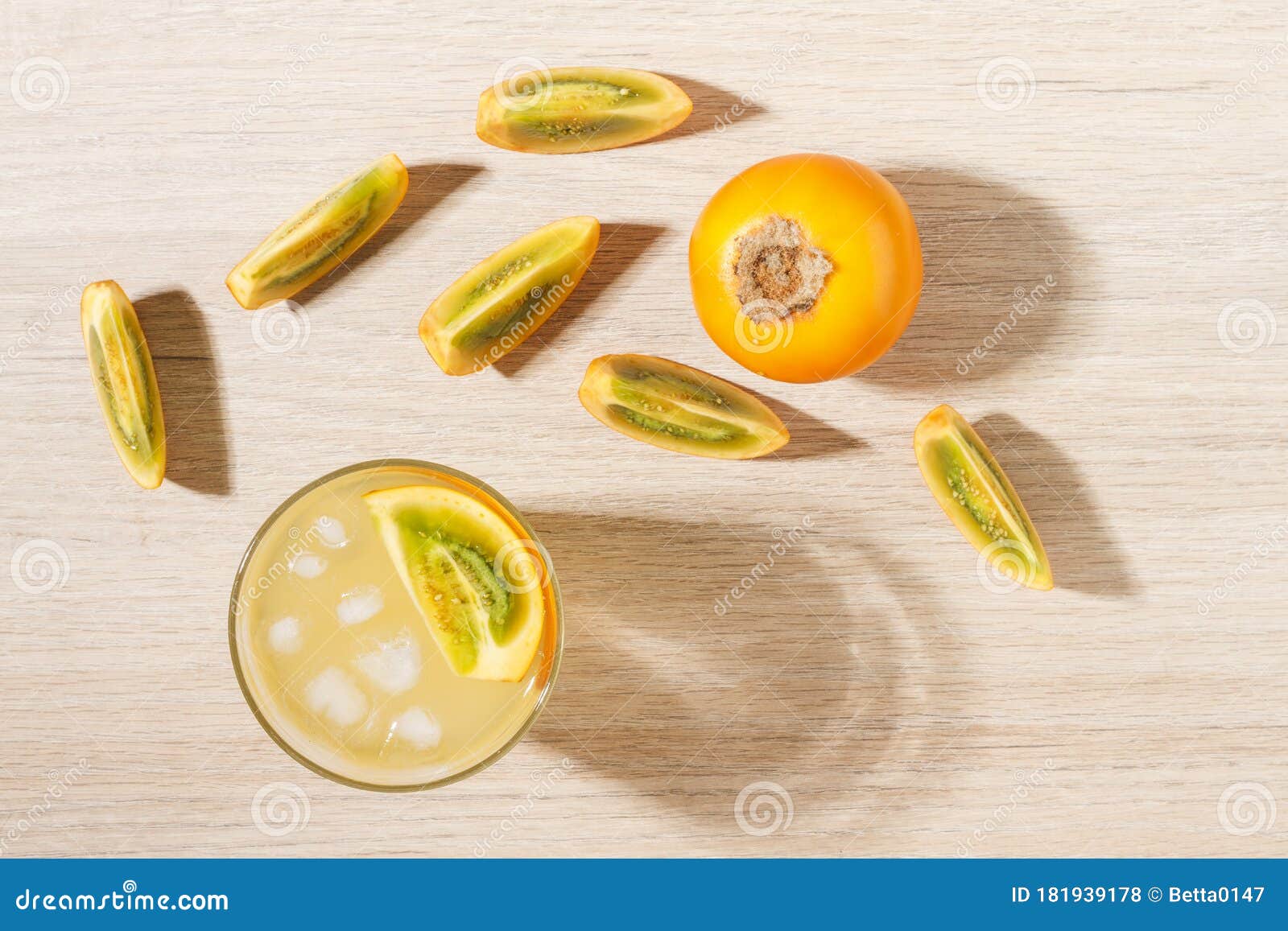 Glass with Juice and Slices of Lulo Fruit, on the Table Stock Photo ...