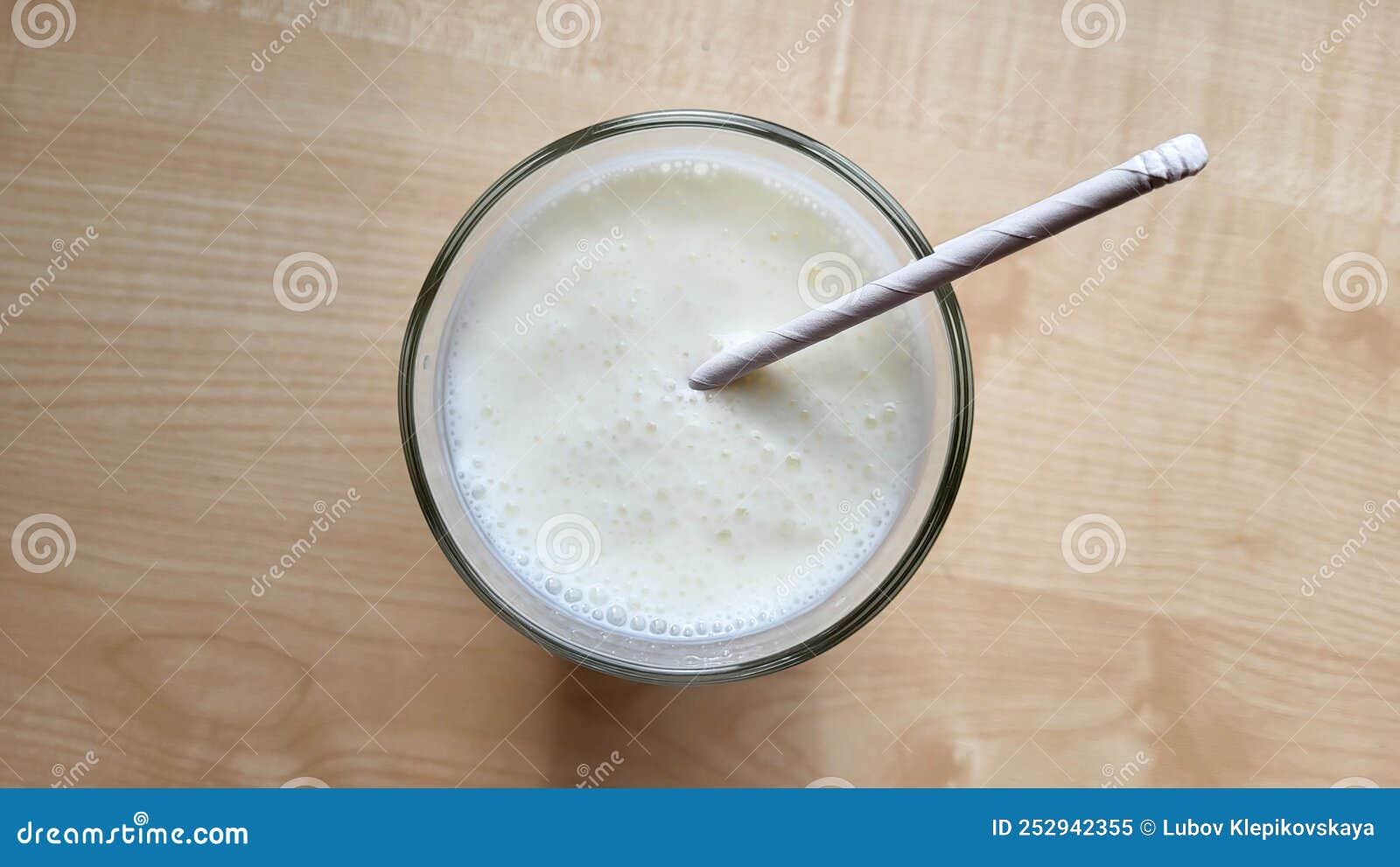 A Glass of Kefir on the Table with a Paper Tube Stock Image - Image of ...