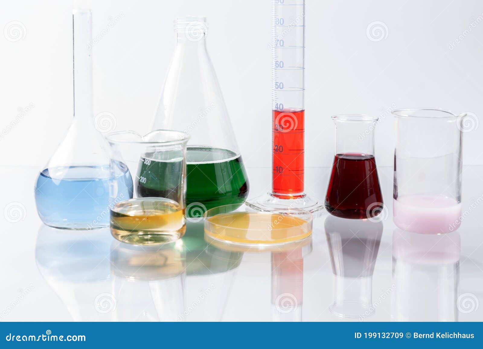 Glass Laboratory Apparatus with Color Water on the Table Stock Image ...