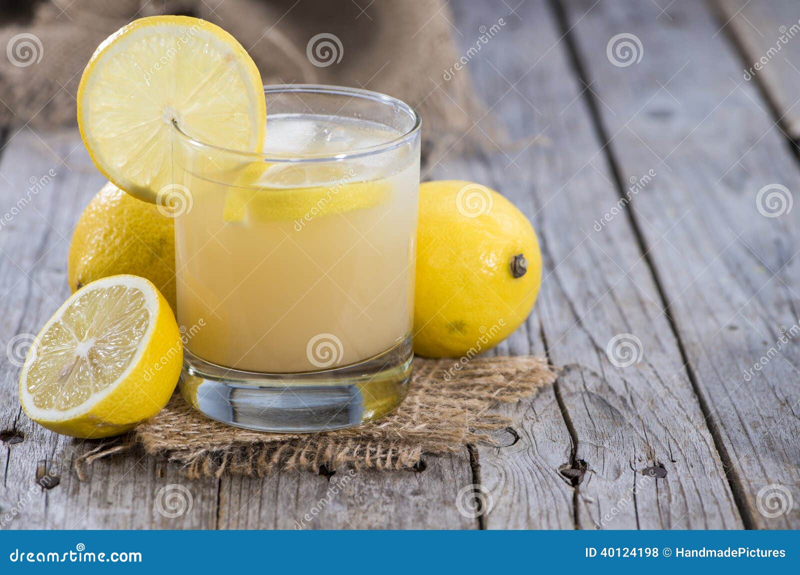 Glass with Lemon Juice stock photo. Image of juicy, portion - 40124198