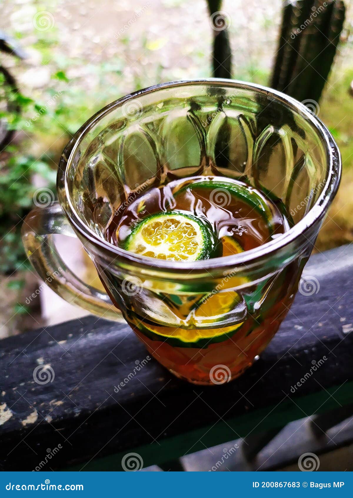 A glass of lemon tea stock image. Image of wheel, glass - 200867683