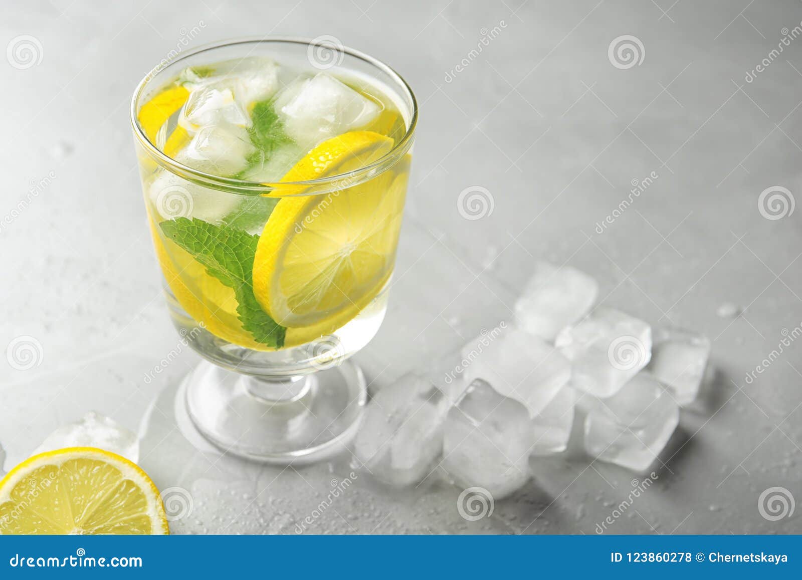Glass with Lemon Water and Ice Cubes Stock Photo - Image of fresh ...