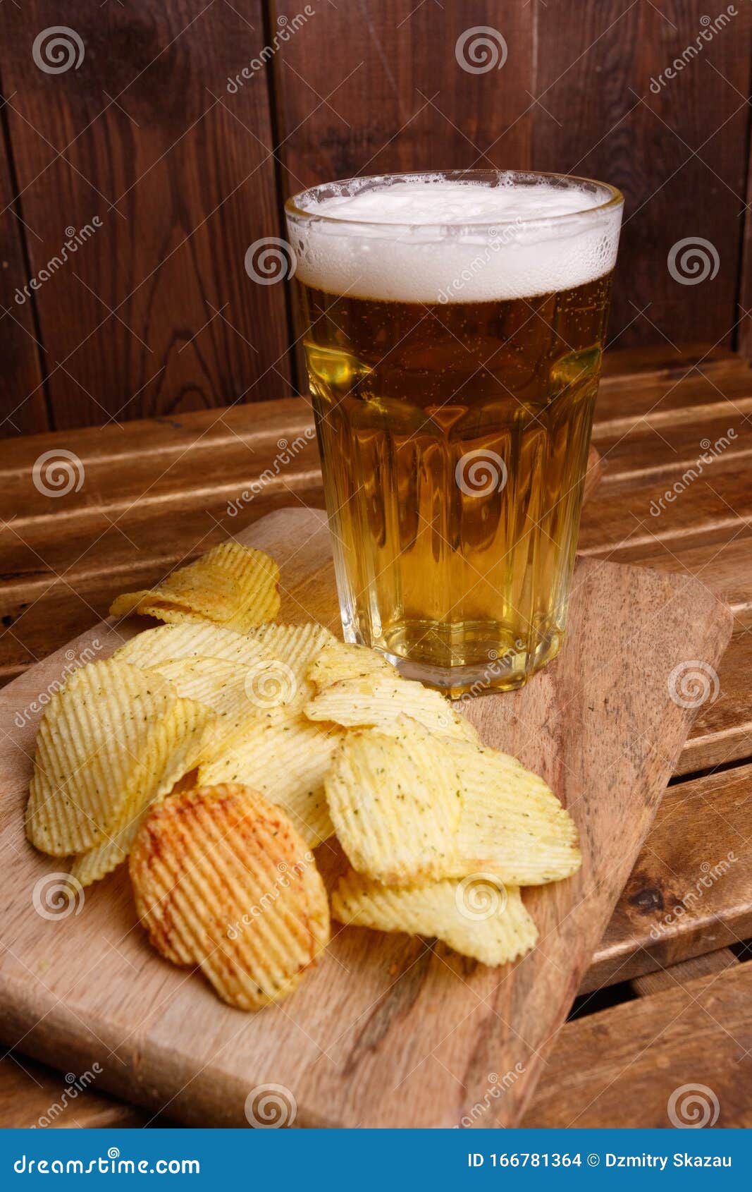Glass of beer and chips stock photo. Image of spices - 166781364