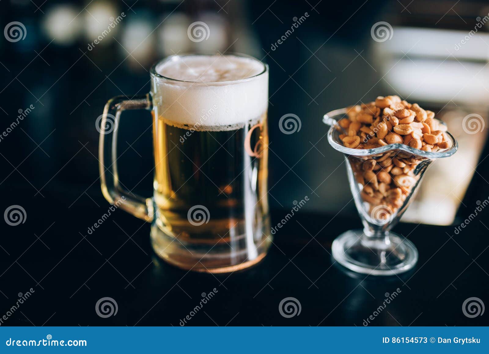 Glass of Light Cold Frothy Beer, Nuts in Pub Stock Image - Image of ...