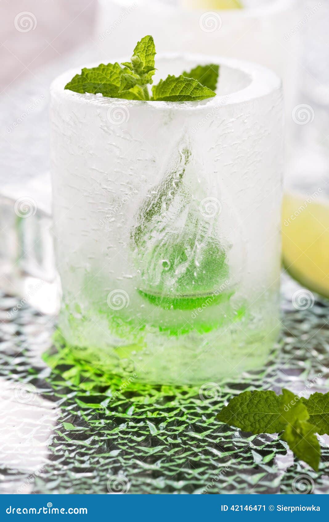 Glass Made of Ice with Vodka, Lemon and Mint Stock Image - Image of ...