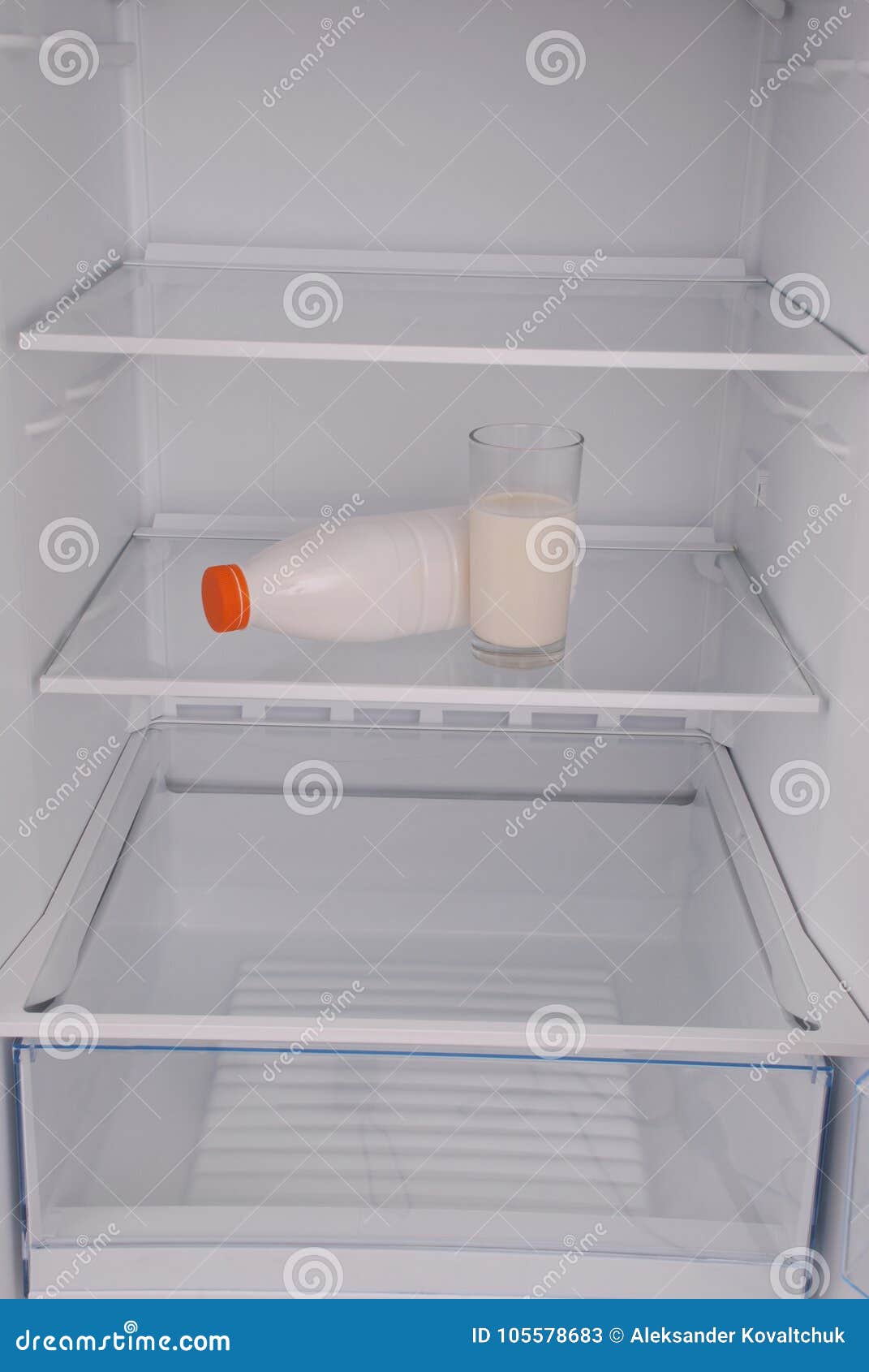 Glass of Milk and Bottle Inside in Empty Clean Refrigerator Stock Image ...