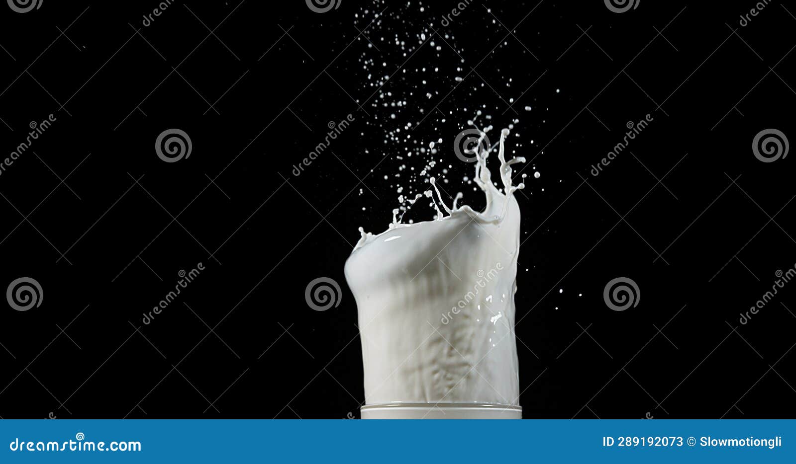 Glass of Milk Exploding Against White Background Stock Image - Image of ...