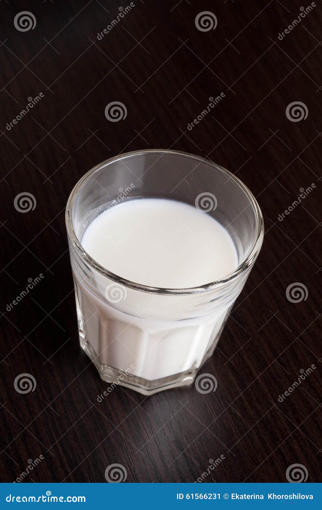 Glass of Milk or Kefir on a Black Table, Vertical Stock Image - Image ...