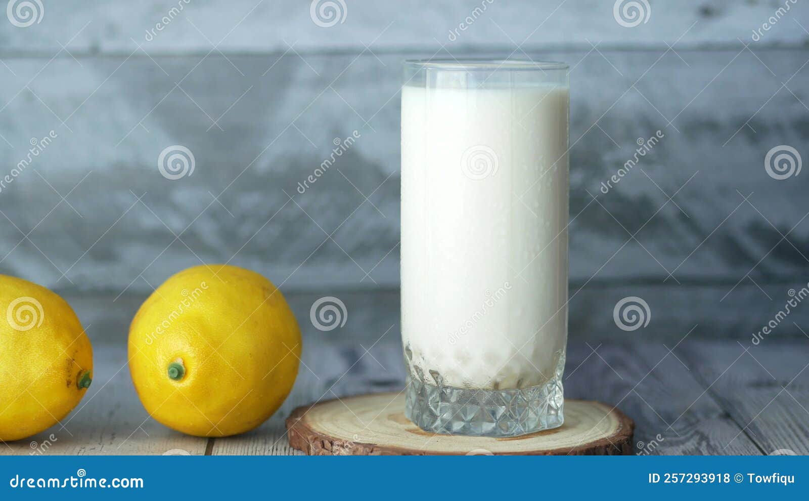 Glass of Milk and Lemon on Table Stock Footage - Video of milk, protein ...