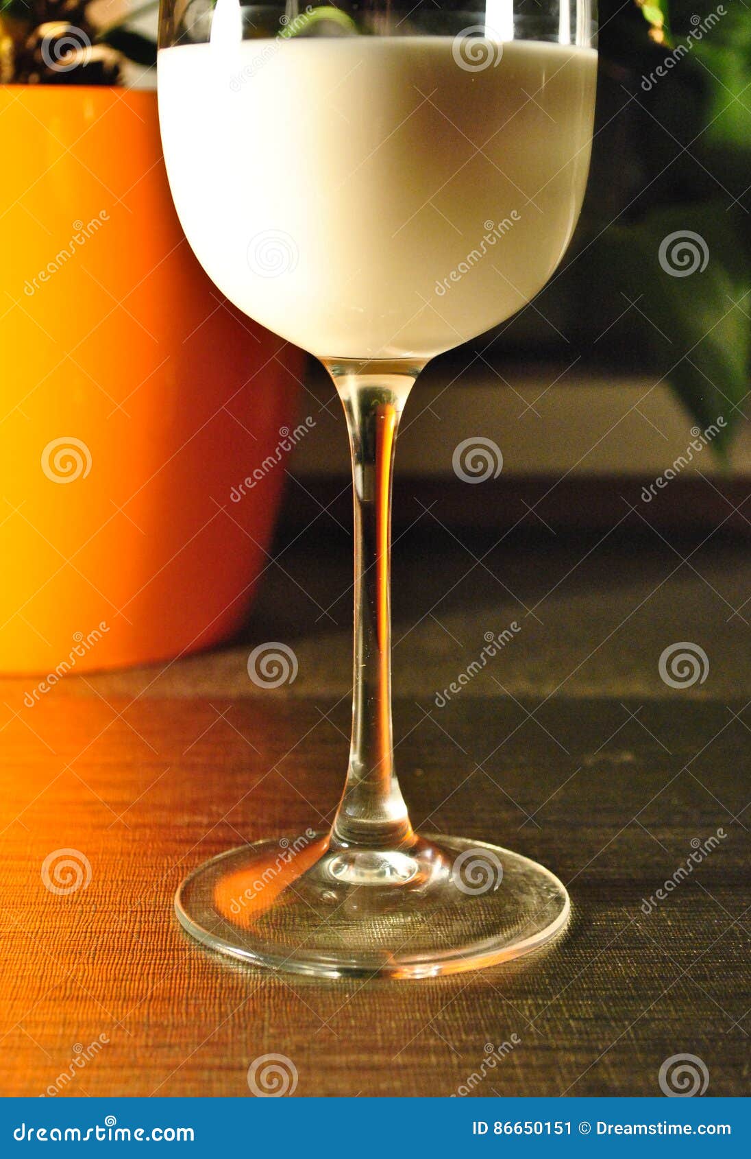 Glass of milk on the table stock image. Image of ware - 86650151