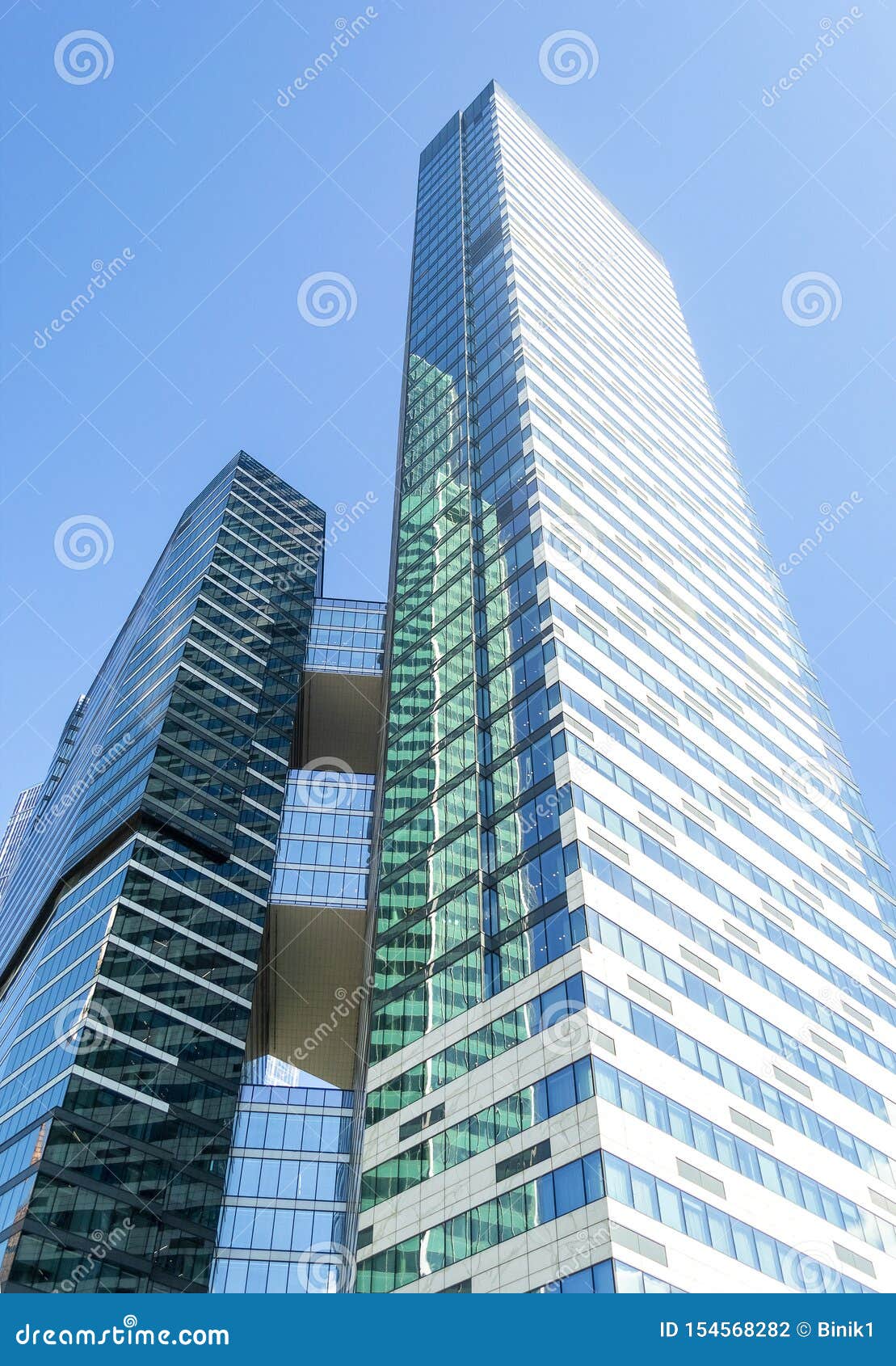 Glass Modern Skyscraper Buildings Opposite Blue Sky Stock Photo - Image ... Glass Modern Skyscraper Buildings Opposite Blue Sky Stock Photo - Image ...