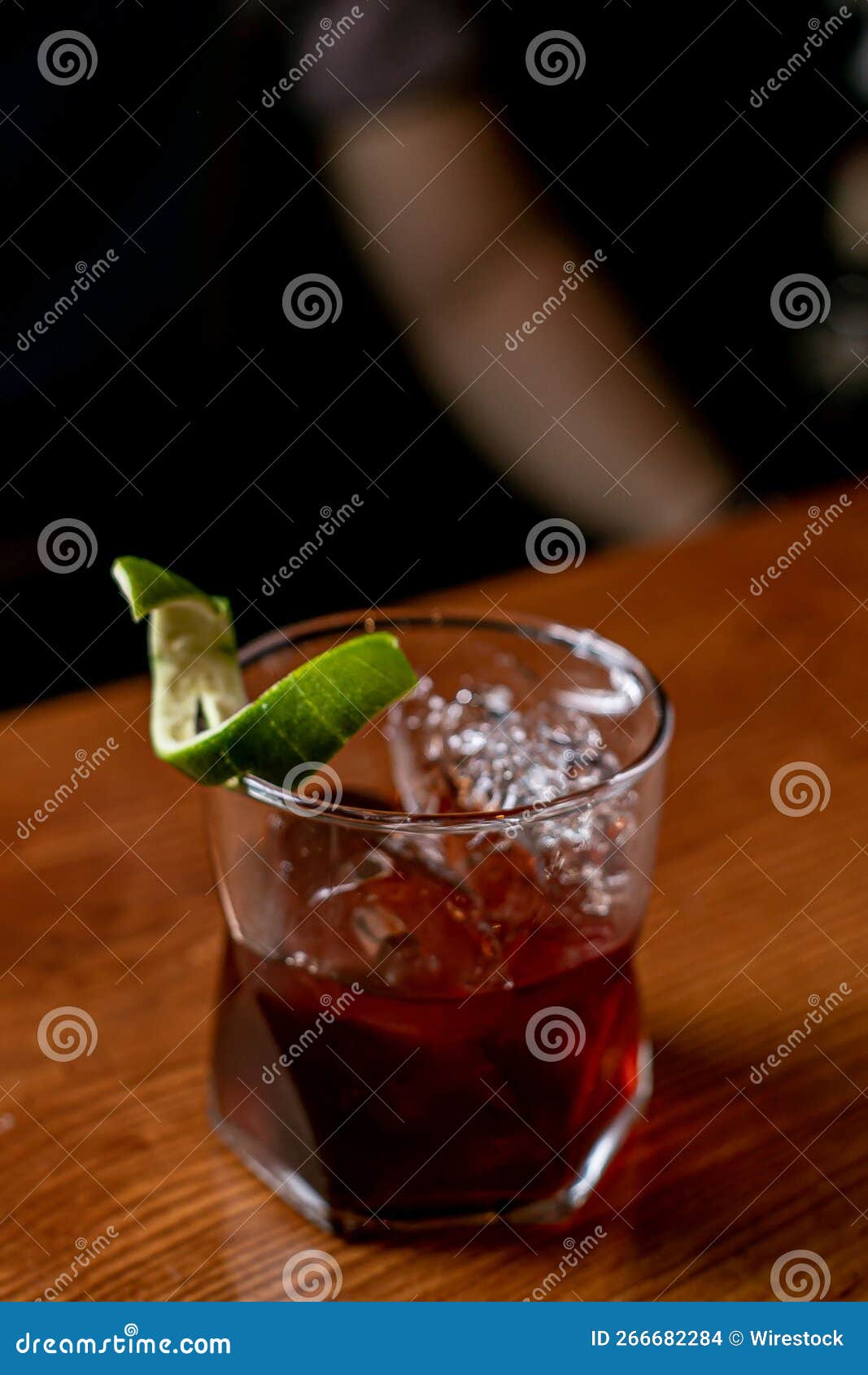 Glass of Negroni with Lime on a Bar Counter Stock Photo - Image of ...