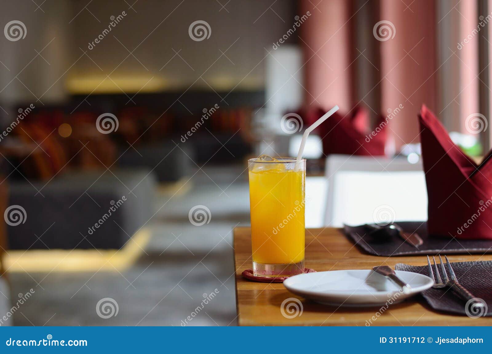 Glass of Orange Juice on the Table Stock Photo - Image of closeup, fork ...