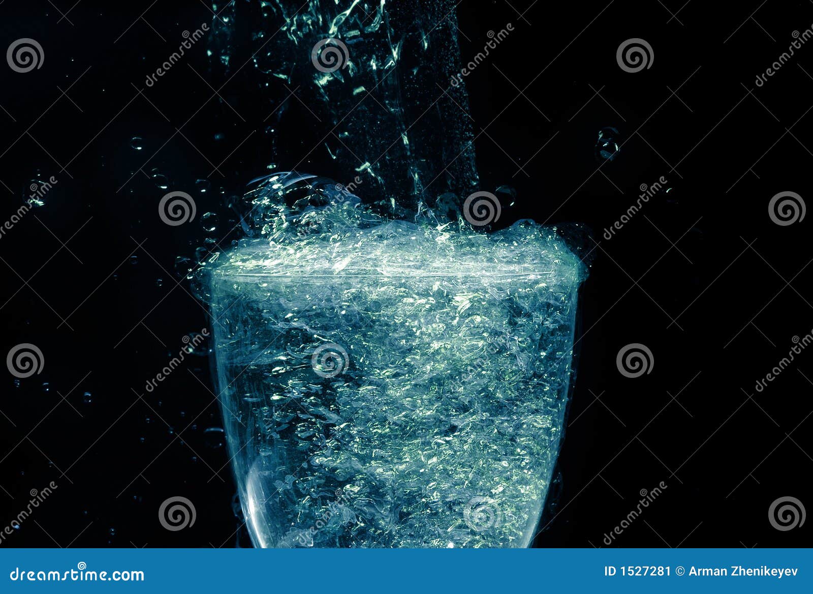 Glass with Overflowing Brilliant Liquid Stock Image - Image of fluid ...