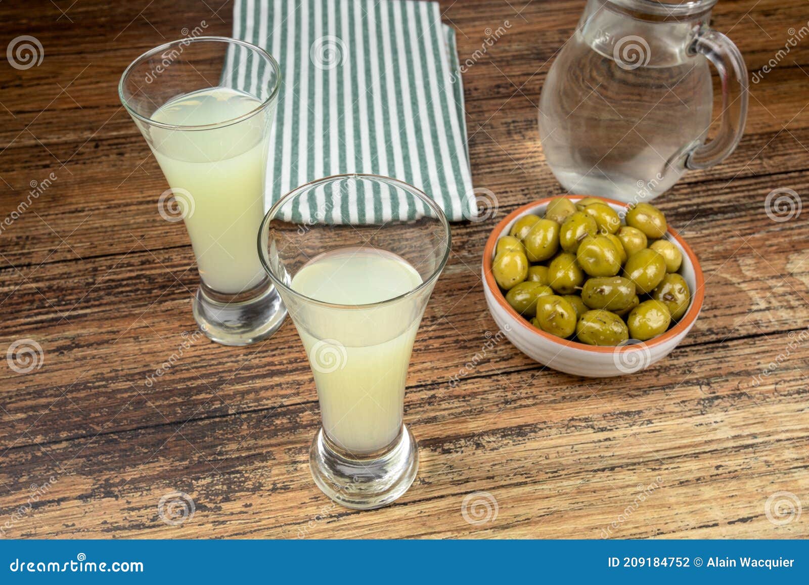 Glass of Pastis on a table stock photo. Image of marseille - 209184752