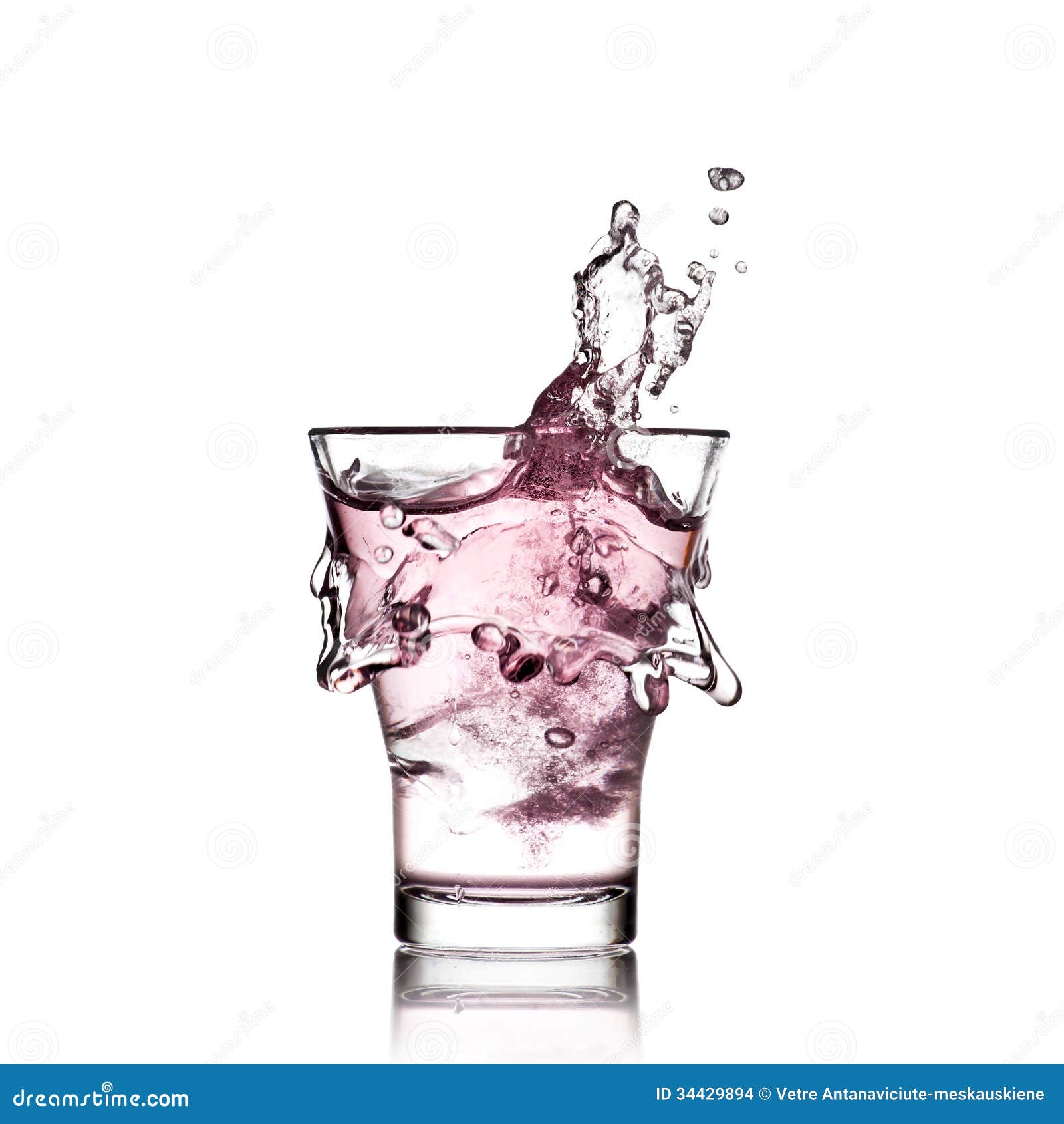 Glass with pink water stock photo. Image of splashing - 34429894