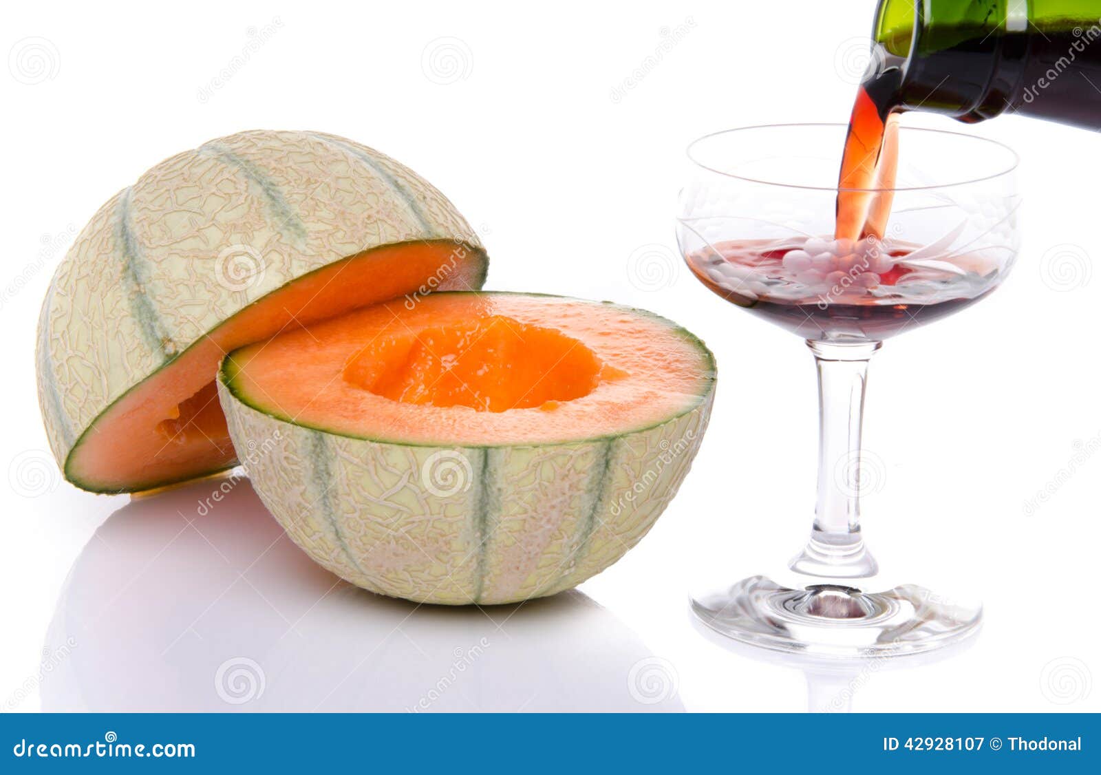 Glass of Porto Wine with a Melon Cut in Half Stock Image - Image of ...