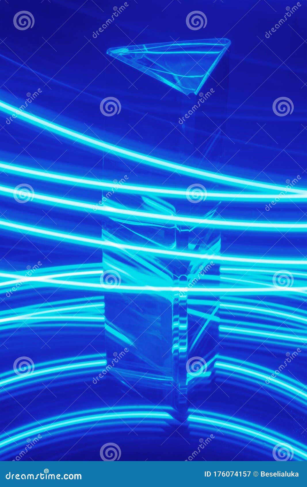 Glass Prism with Reflection on a Abstract Blue Neon Background Stock ...