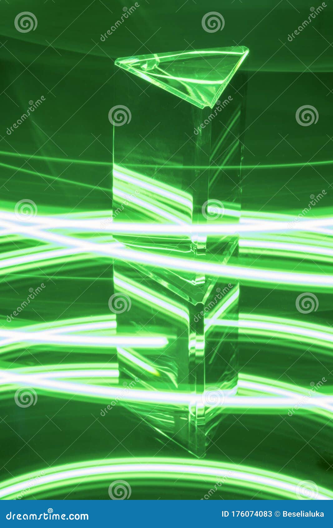 Glass Prism with Reflection on a Abstract Green Neon Background Stock ...
