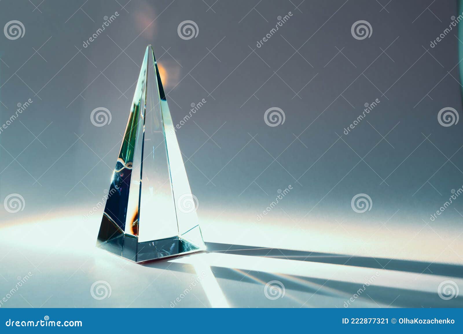 Glass Pyramid Prism with Colorful Sunlight Reflection on Background ...
