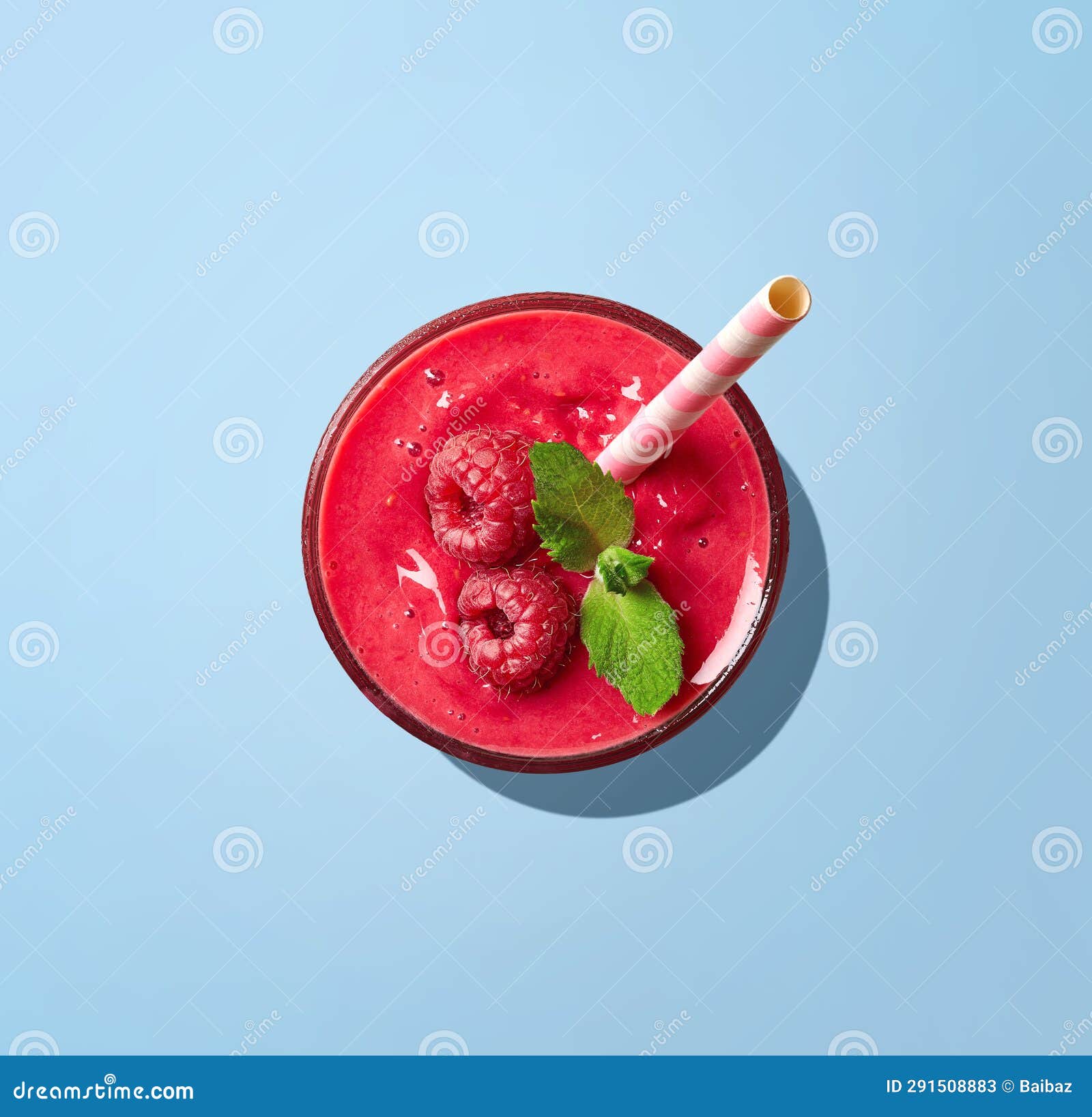 Glass of Raspberry Smoothie on Blue Background Stock Image - Image of ...